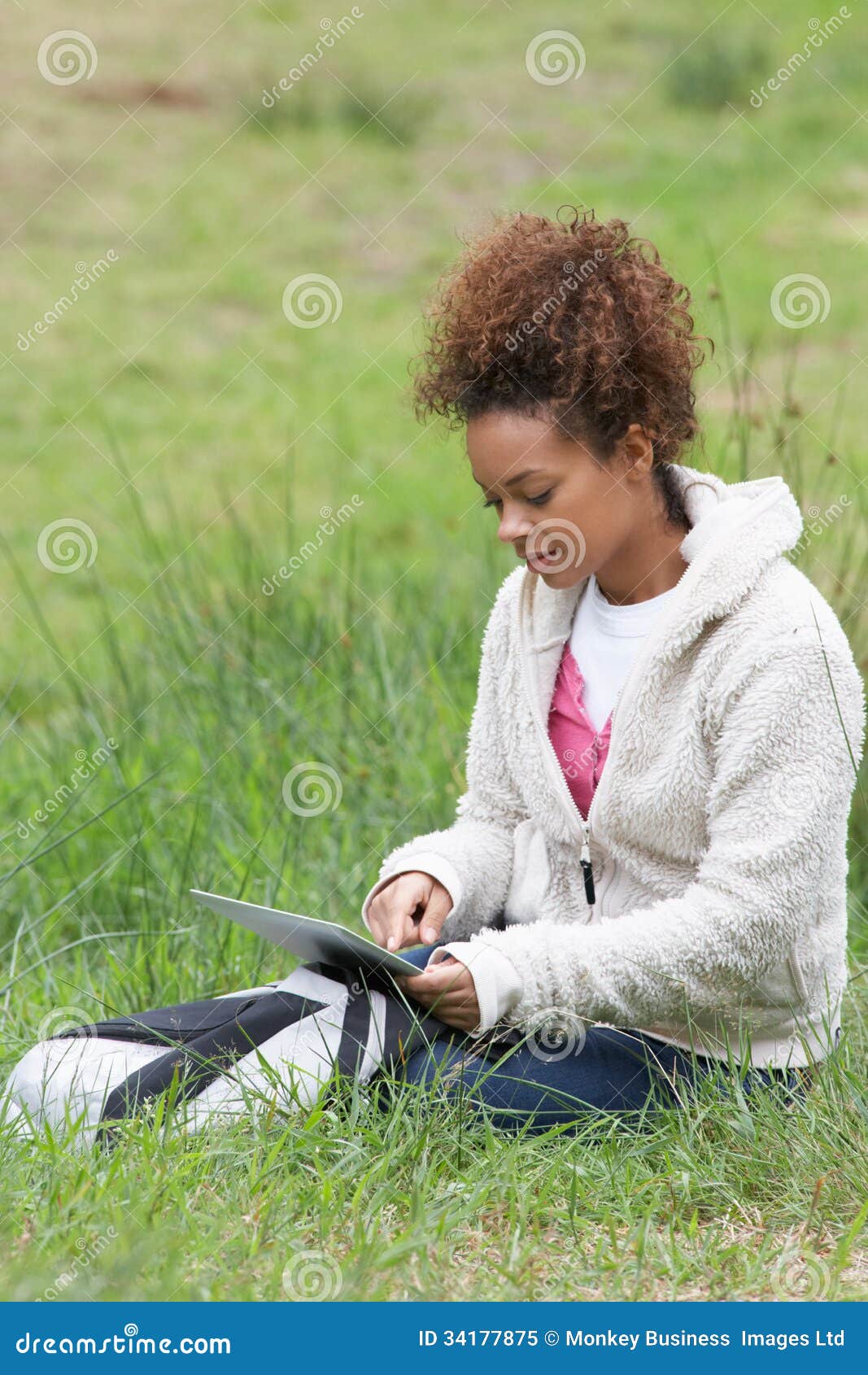 Woman Using Digital Tablet Whilst Hiking in Countryside Stock Image ...