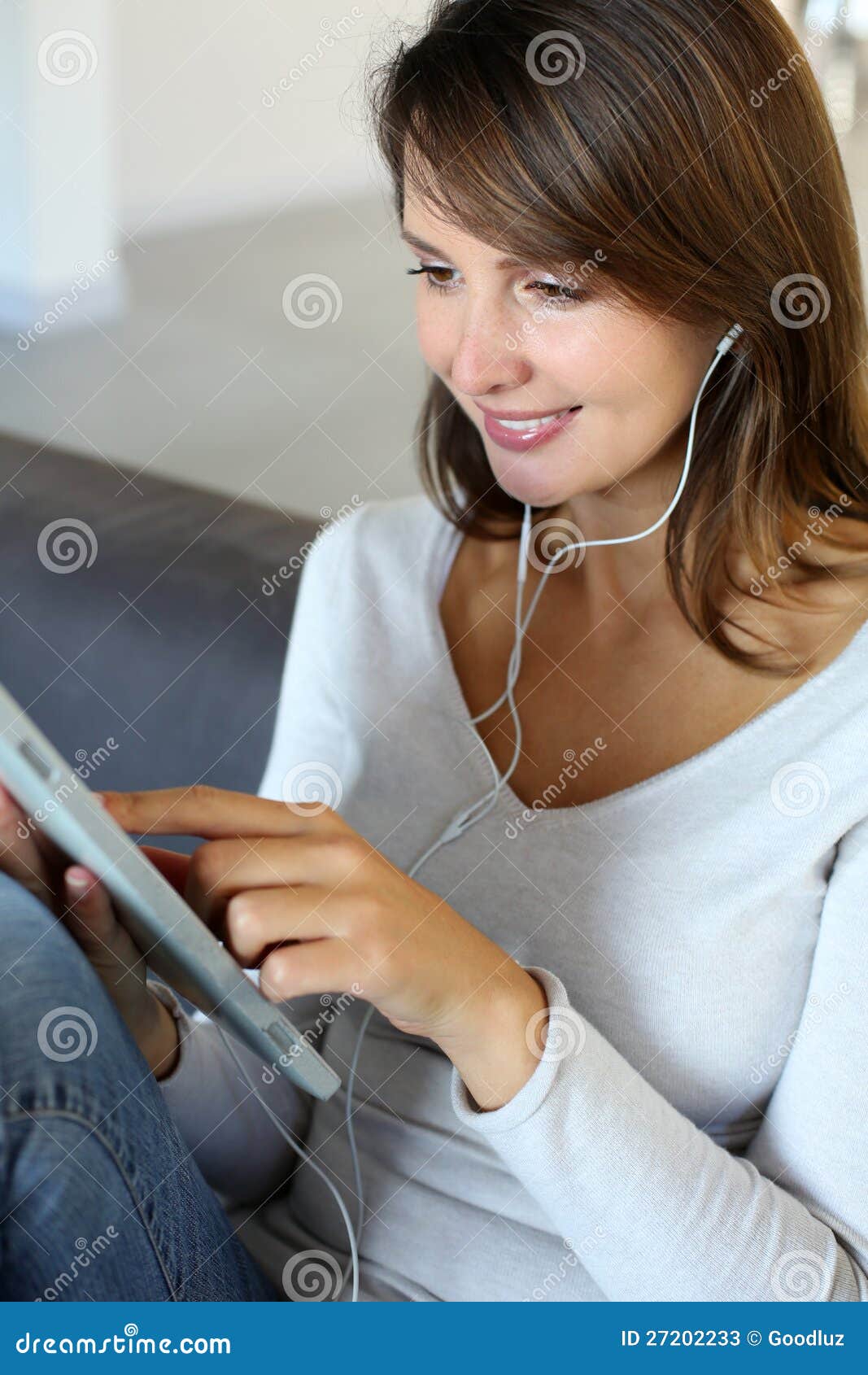 Woman Using Electronic Tablet Stock Image - Image of casual, smiling ...
