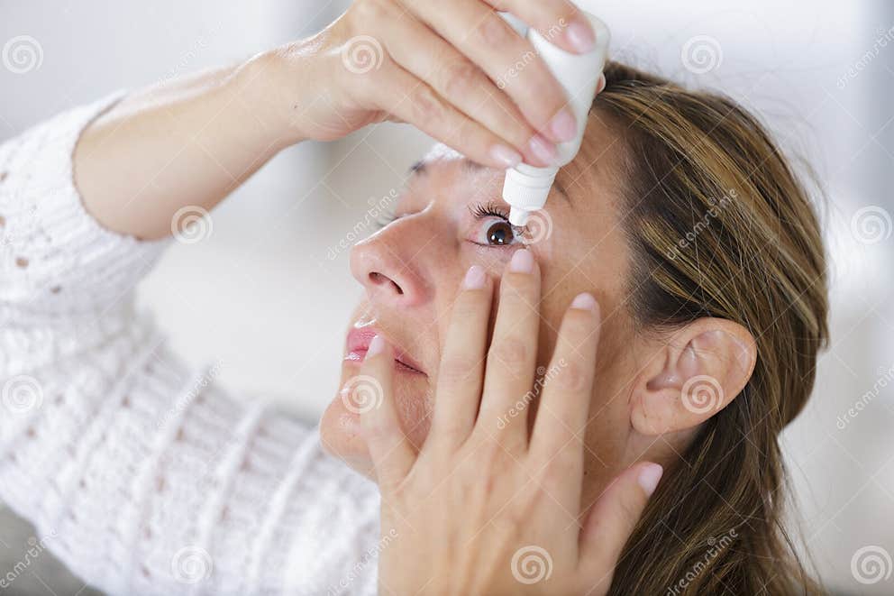 Woman Using Eye Drop Liquid for Eye Problems Stock Photo - Image of ...