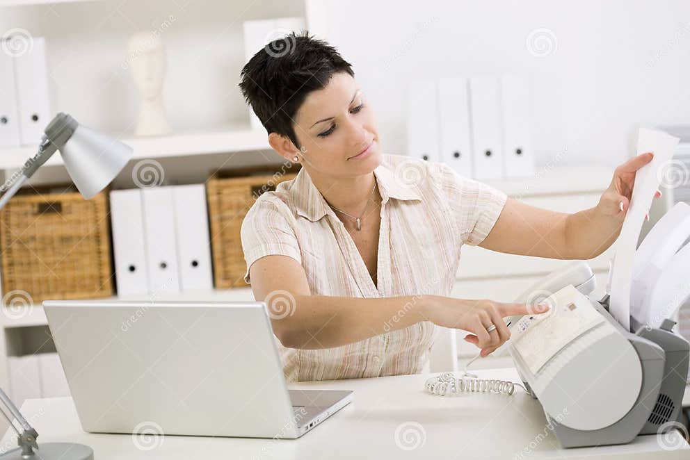 Woman using fax machine stock photo. Image of cheerful - 7073262