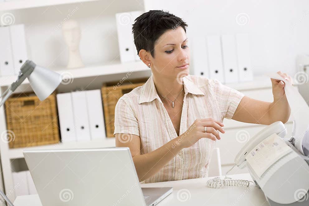 Woman using fax machine stock photo. Image of indoor, attractive - 7142858