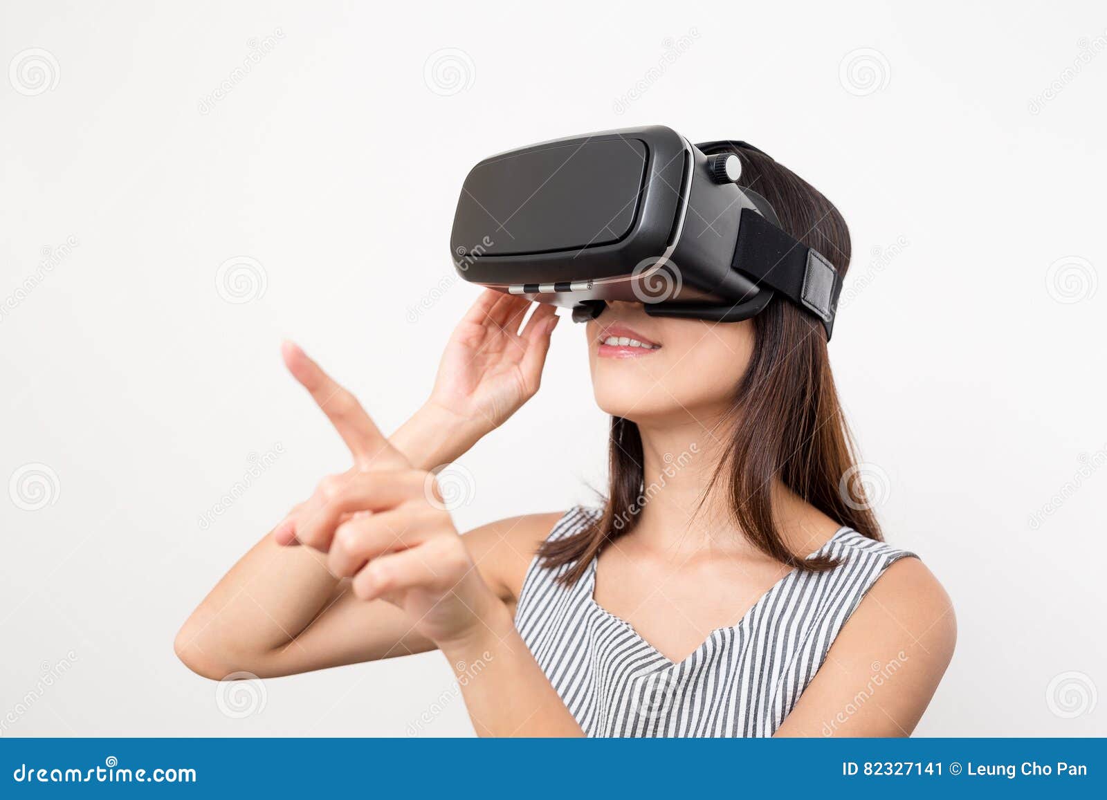 Woman Using Finger To Touch on Imaginary Panel Viewing on VR Device ...