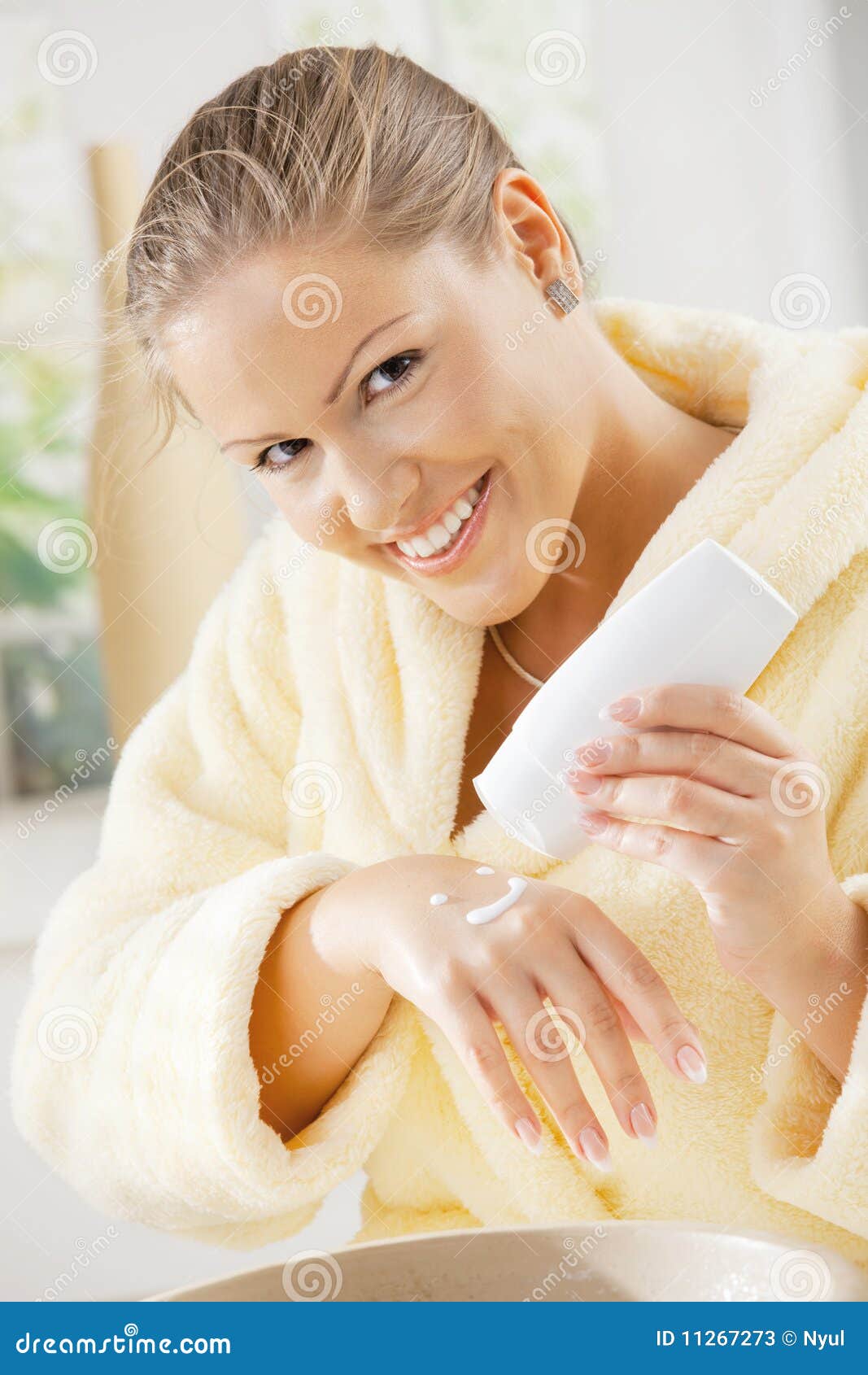 Woman using hand cream stock image. Image of female, caucasian - 11267273