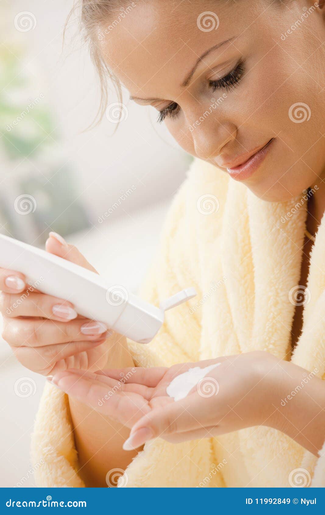 Woman using hand cream stock image. Image of feminine - 11992849