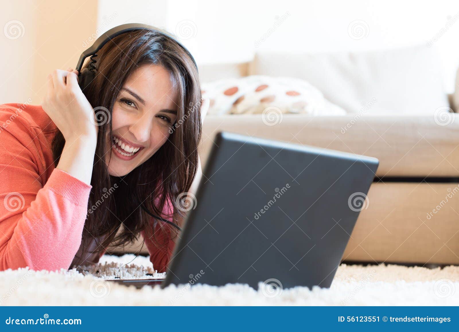 Woman using headphones stock image. Image of reading - 56123551