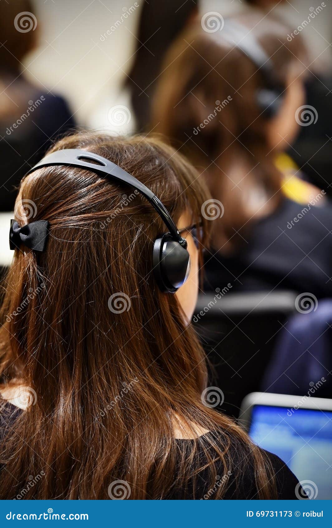 Woman Using Headphones for Translation Editorial Stock Photo - Image of ...
