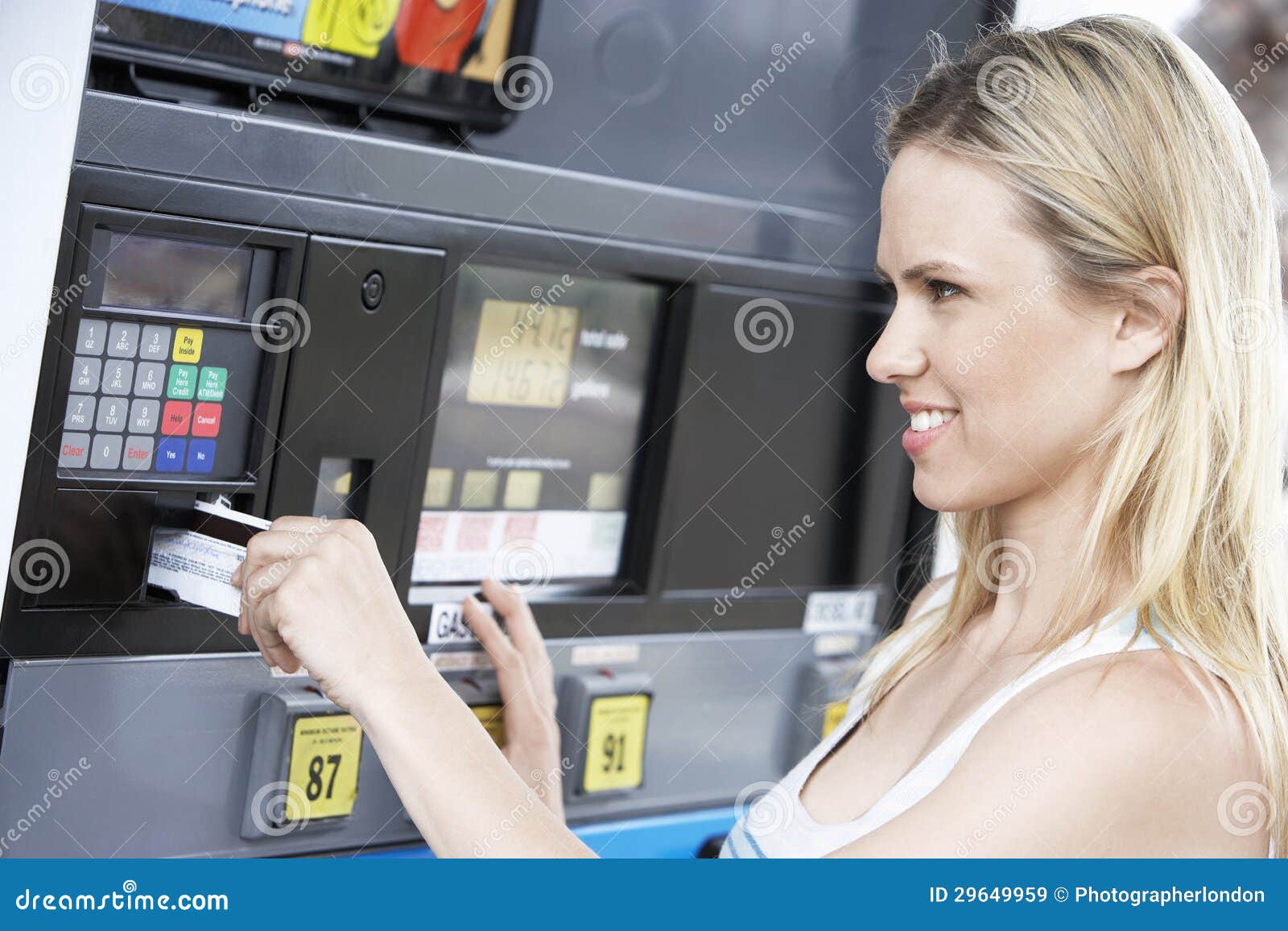 Woman Using Her Debit Card To Pay for Gasoline Stock Image - Image of ...