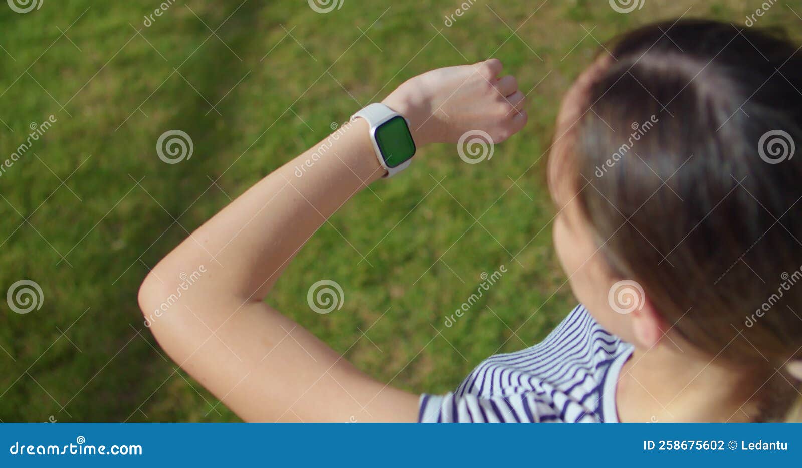 Woman Using Her Smartwatch Touchscreen with Greenscreen. Stock Footage ...
