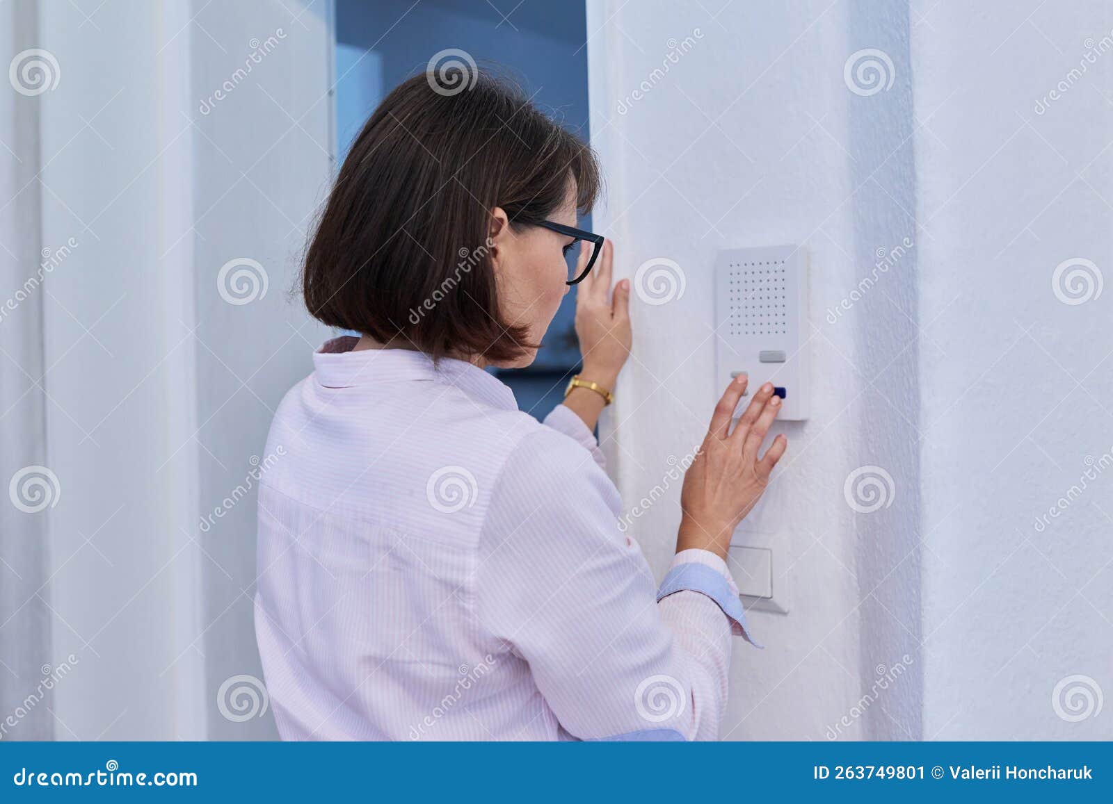 Woman Using Intercom Inside the House, Closeup Stock Image - Image of ...