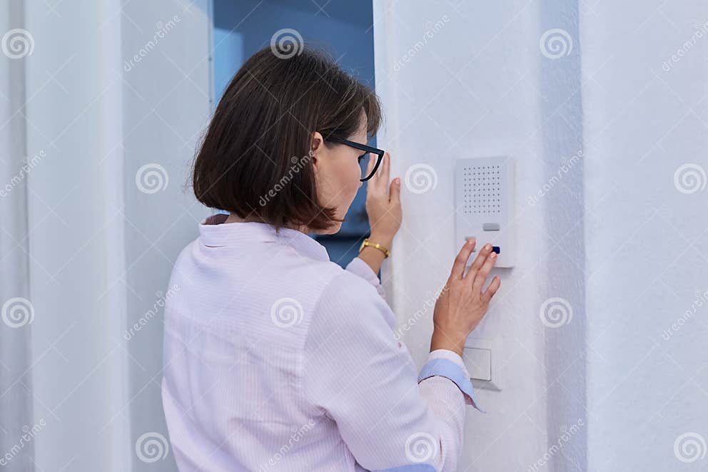 Woman Using Intercom Inside the House, Closeup Stock Image - Image of ...