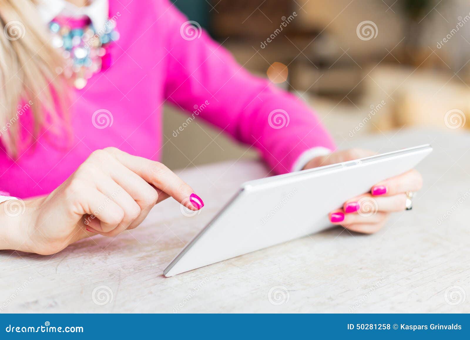Woman Using Internet on Tablet Computer in Cafe Stock Photo - Image of ...