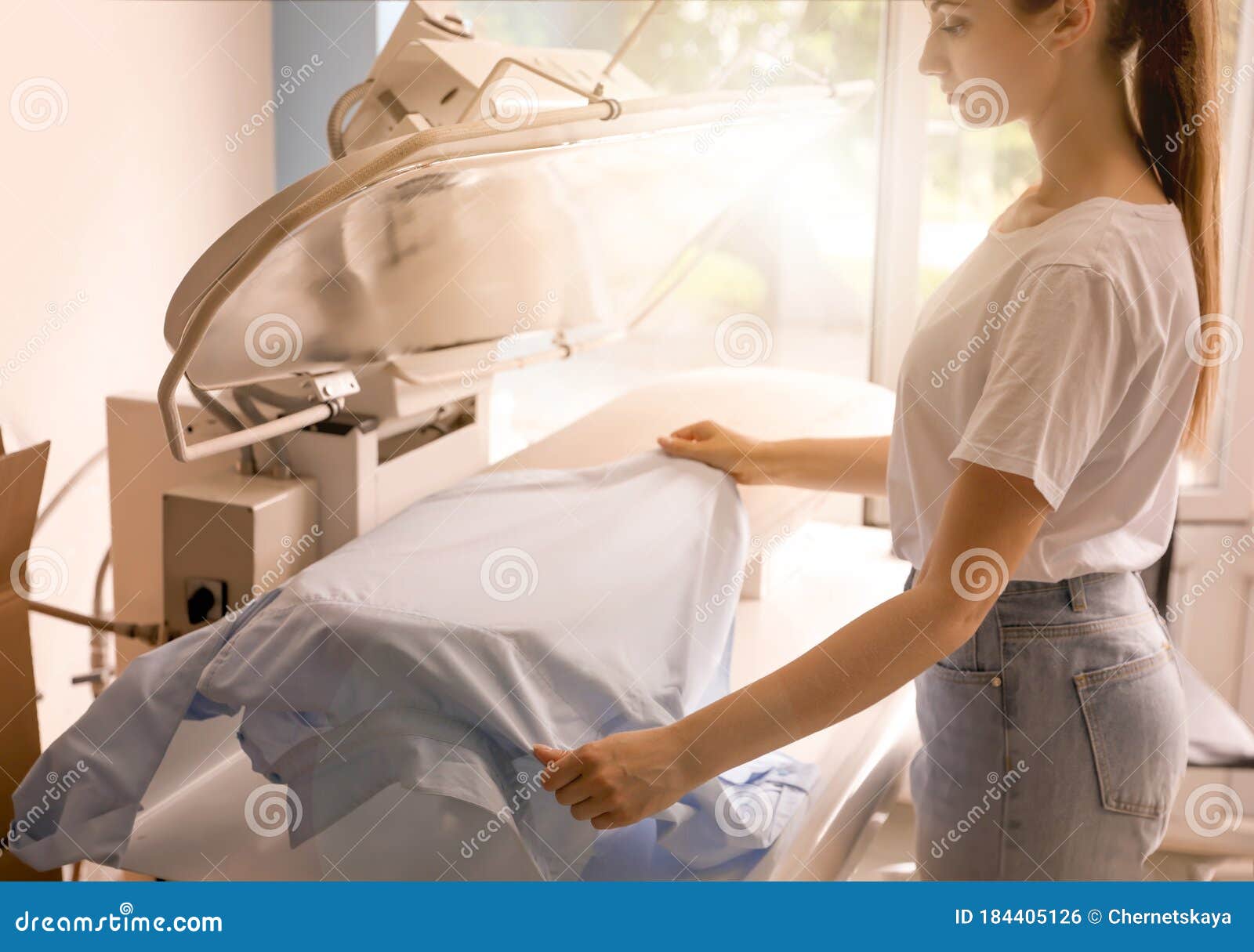 Woman Using Ironing Press in Dry-cleaning Stock Photo - Image of ...