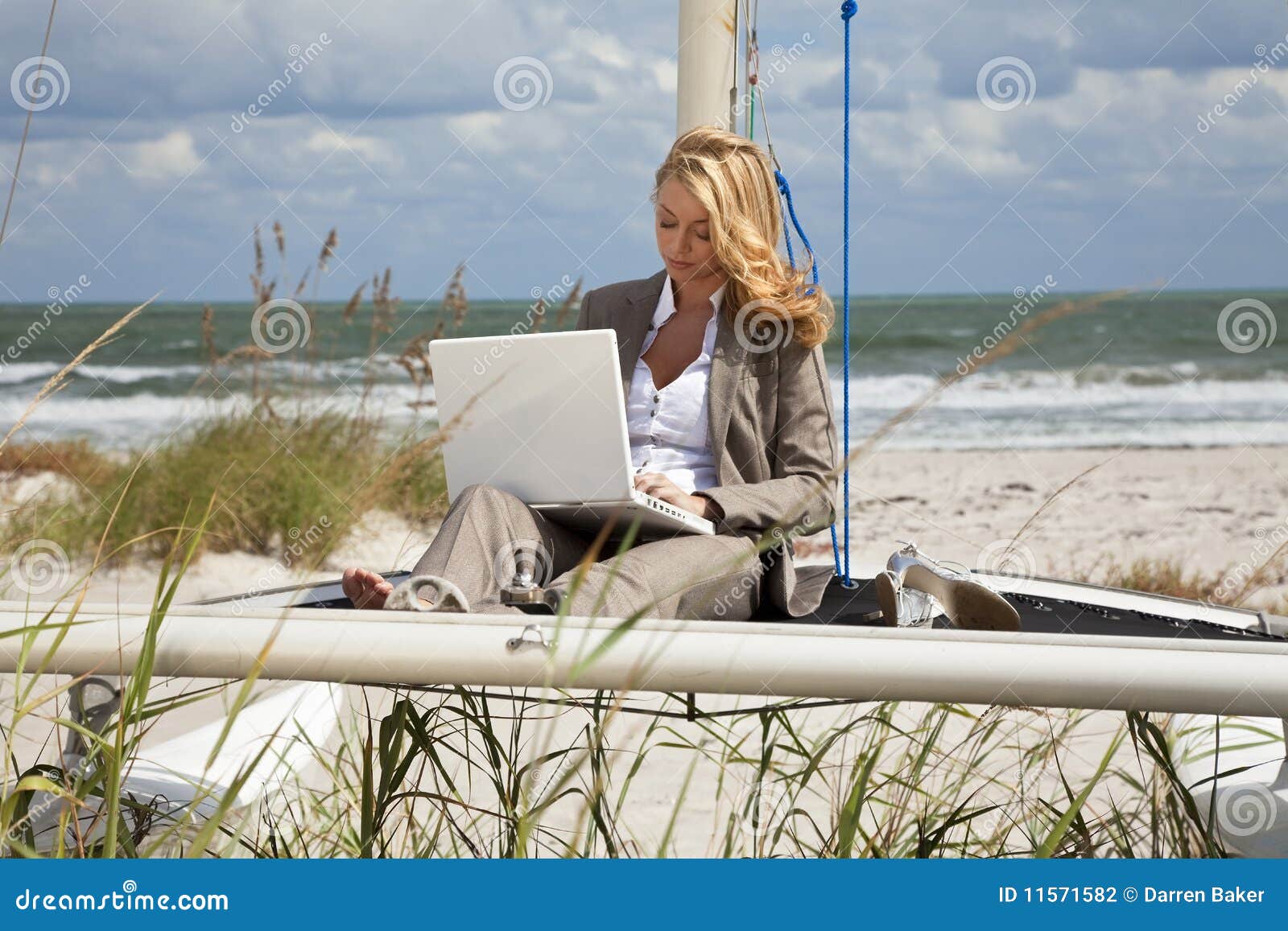 Woman Using Laptop on Boat at the Beach Stock Photo - Image of summer ...