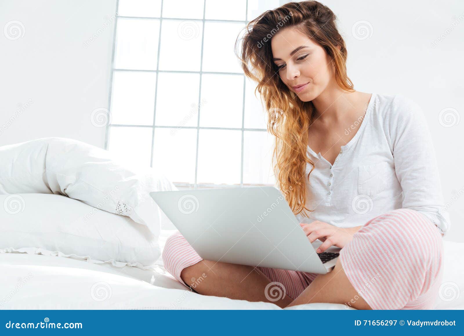 Woman Using Laptop Computer on the Bed Stock Image - Image of girl ...