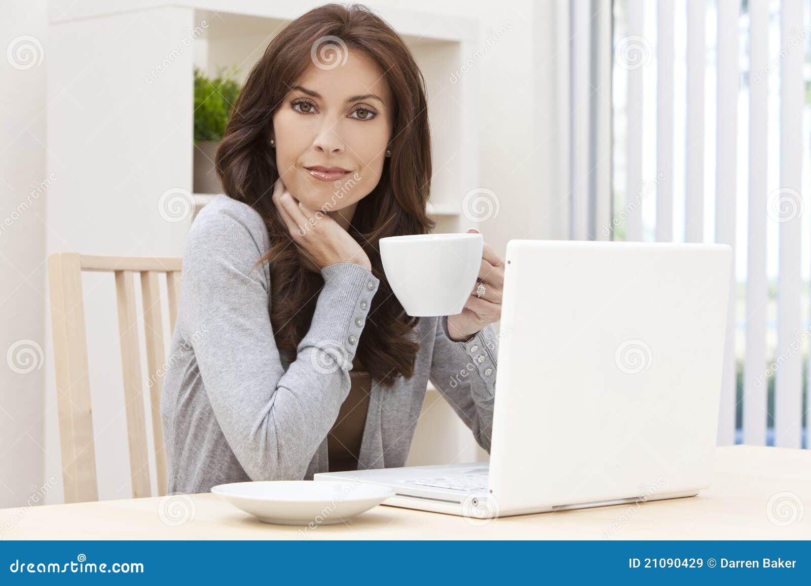 Woman Using Laptop Computer Drinking Tea or Coffee Stock Image - Image ...
