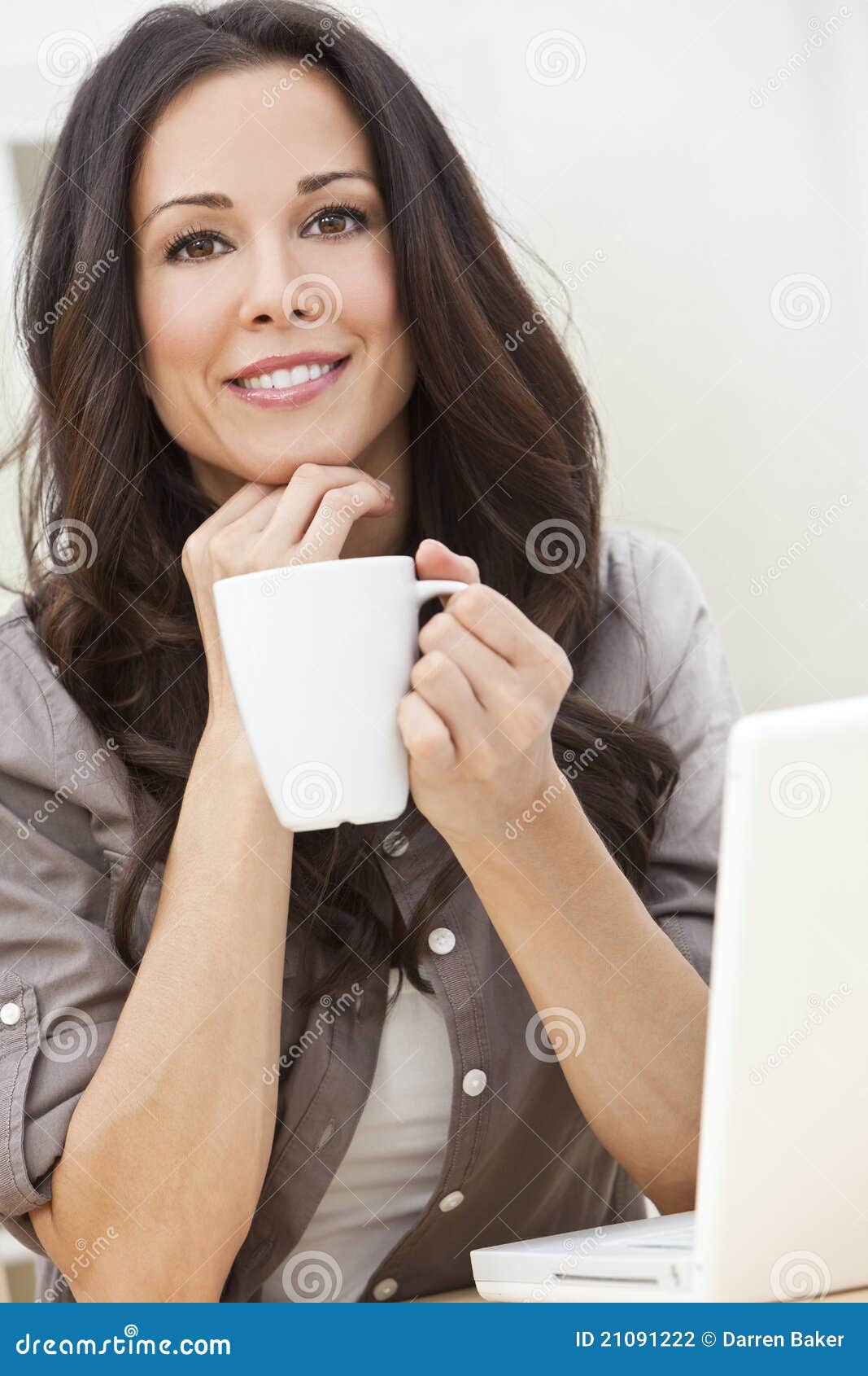 Woman Using Laptop Computer Drinking Tea or Coffee Stock Photo - Image ...