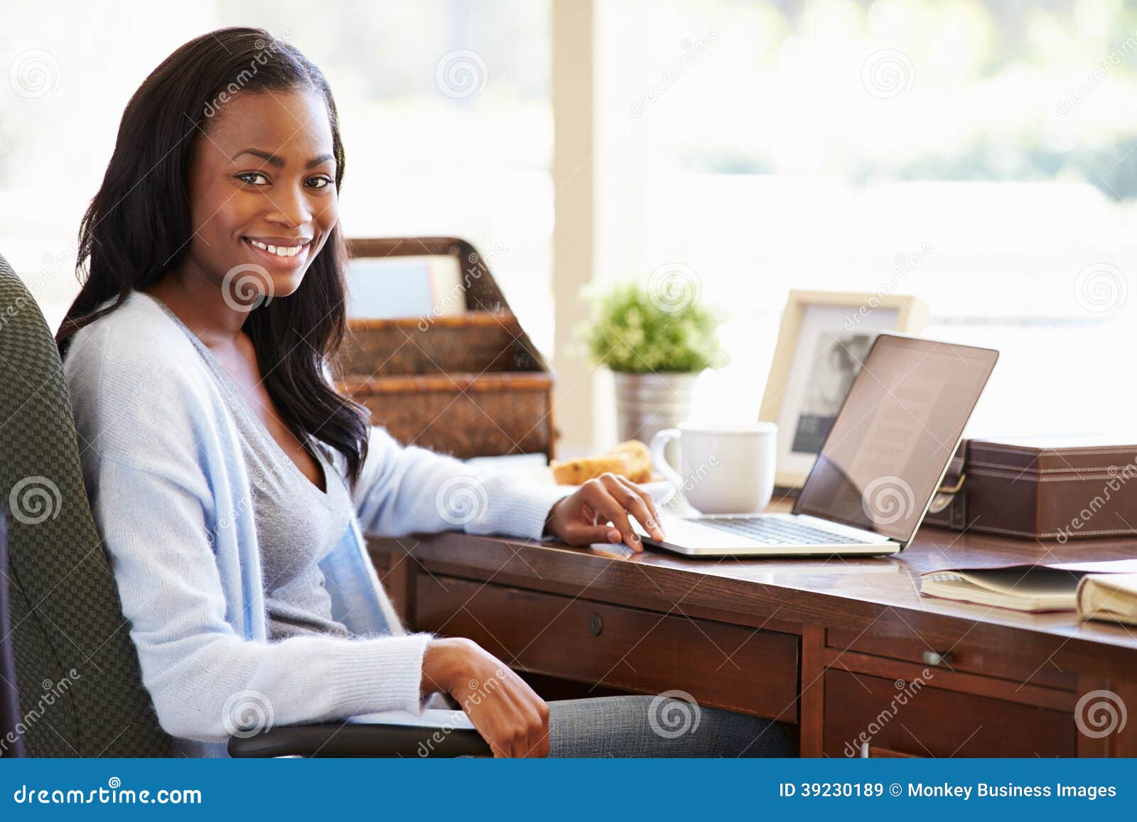 Woman Using Laptop on Desk at Home Stock Image - Image of people ...