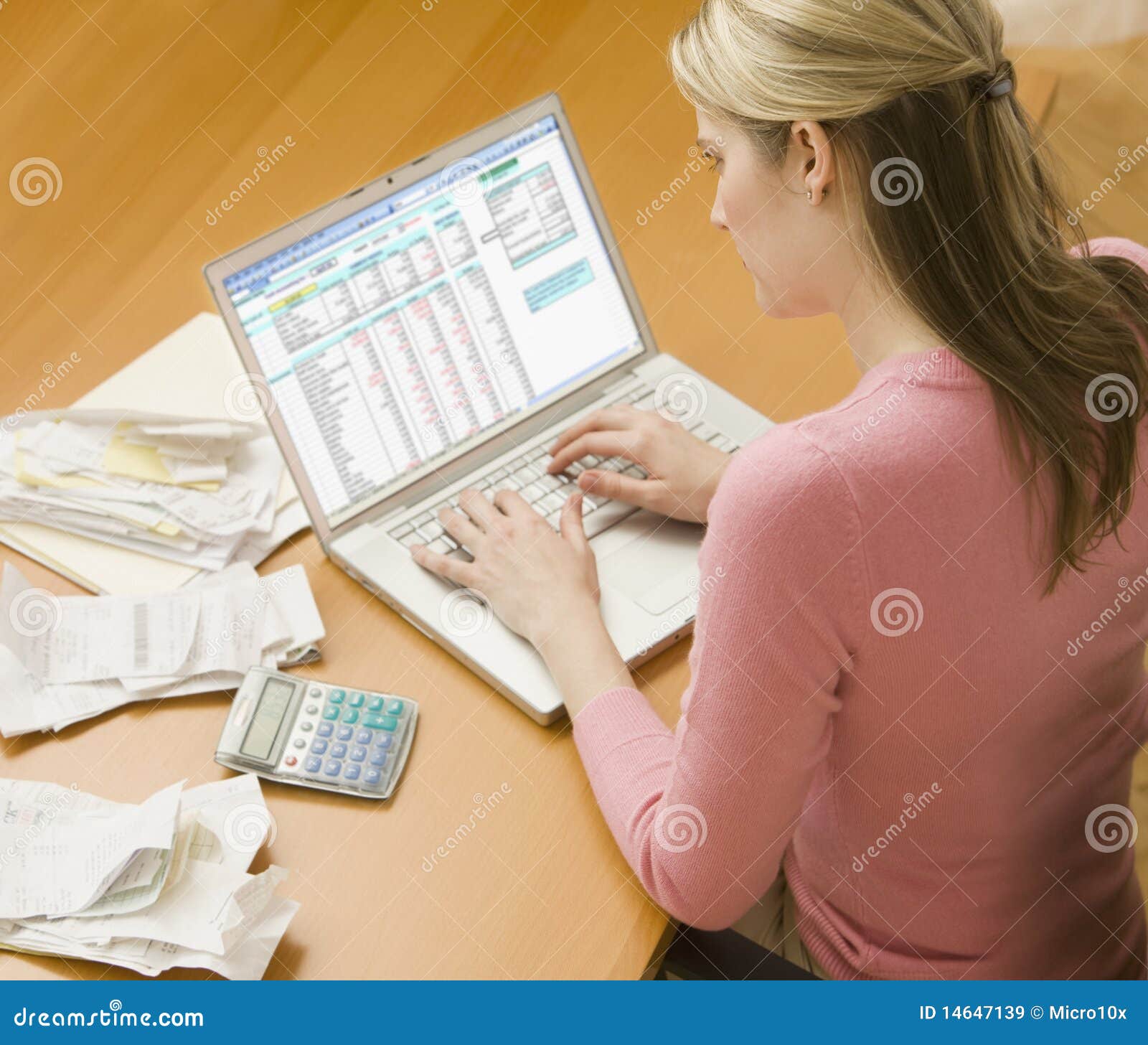 Woman Using Laptop for Finances Stock Image - Image of bills, blond ...