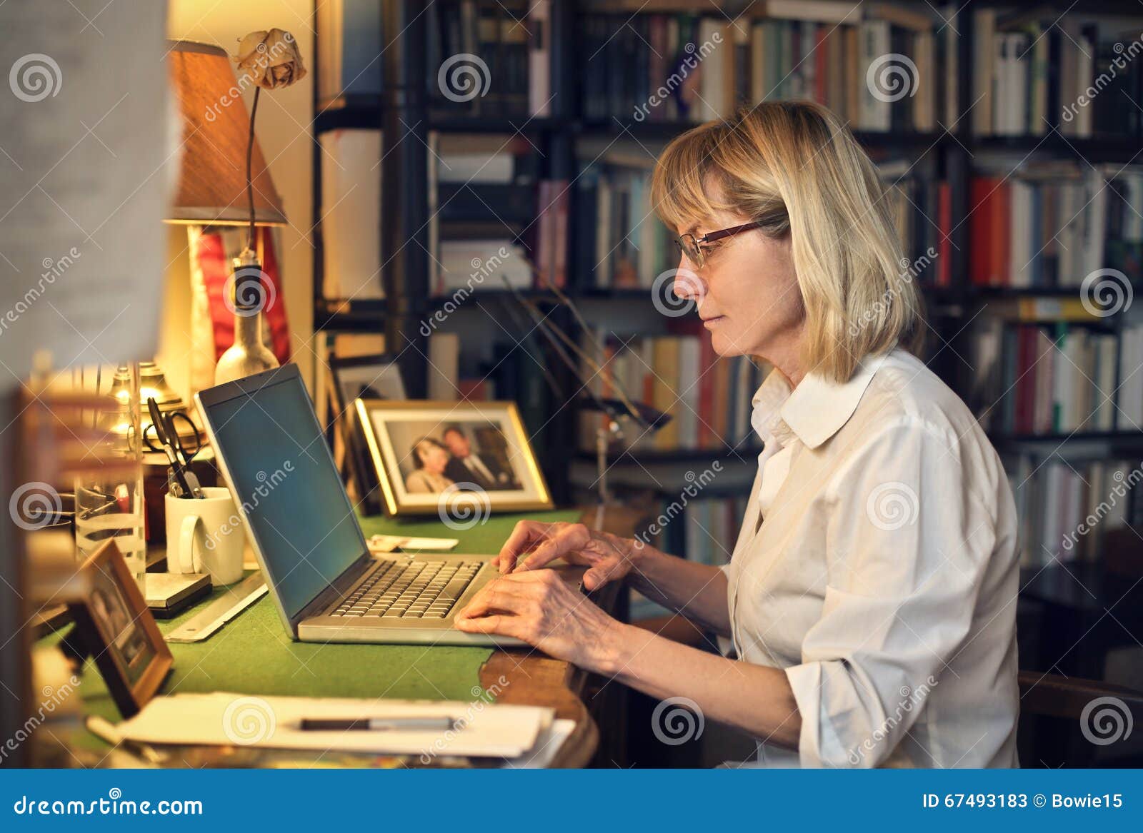 Woman Using Laptop on Her Office Stock Image - Image of concept, lamp ...