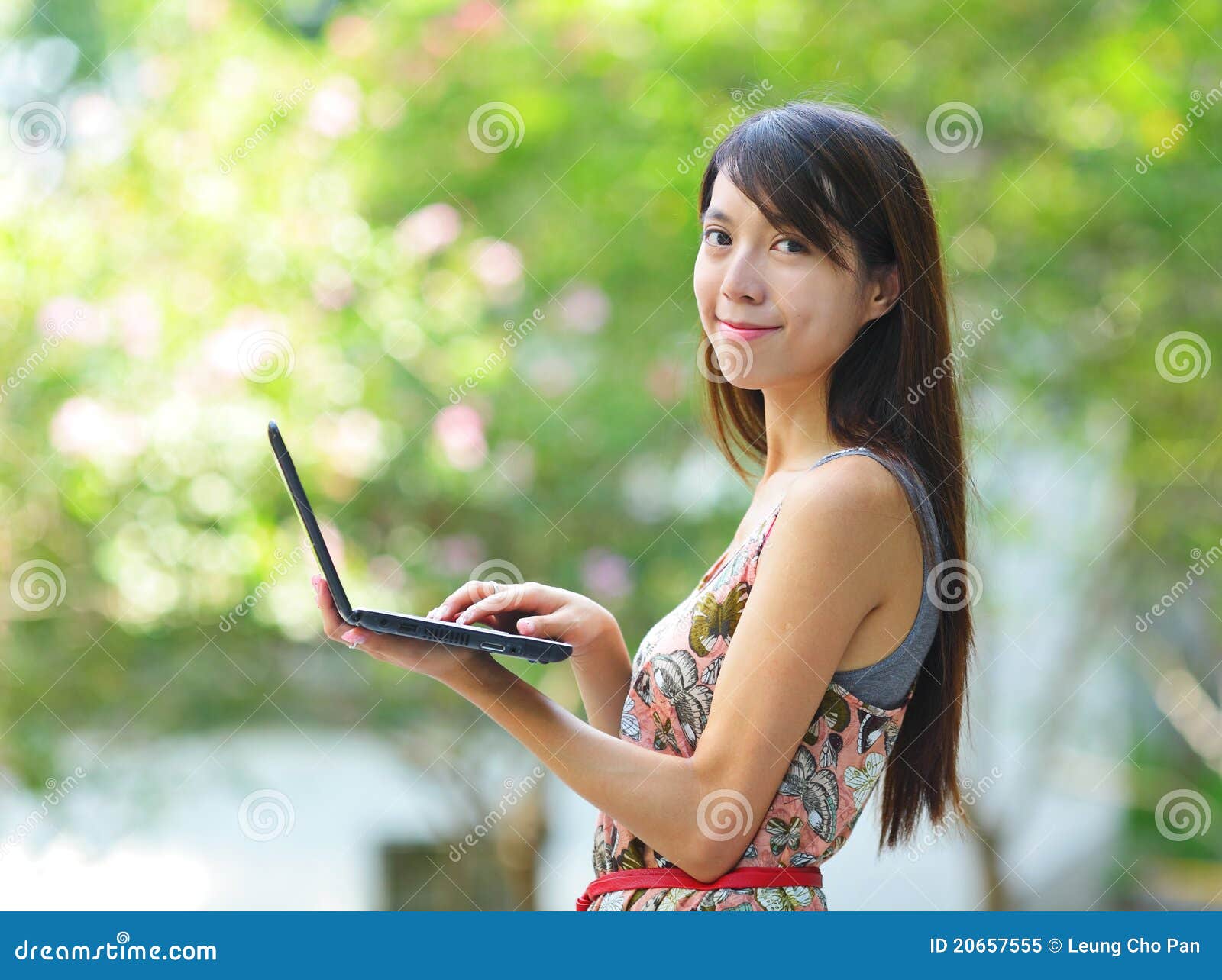 Woman Using Laptop Outdoors Stock Image - Image of laptop, mobile: 20657555