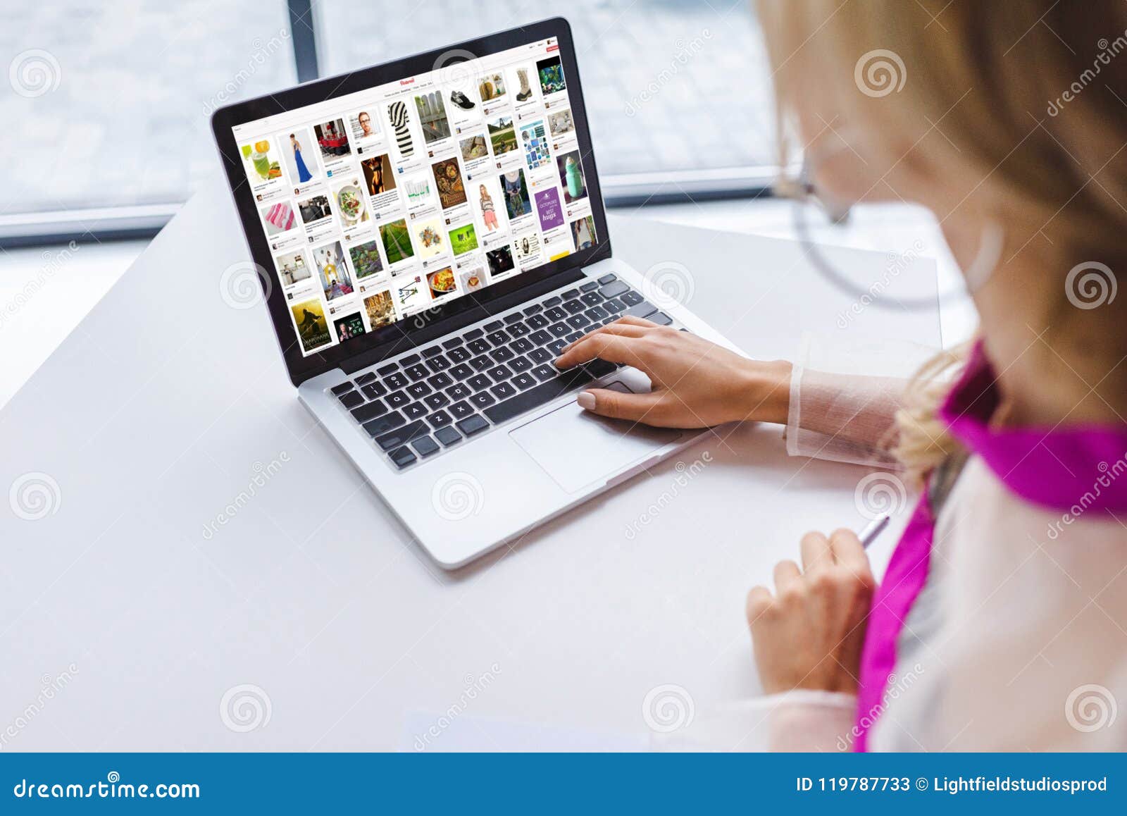 Woman Using Laptop with Pinterest Editorial Stock Photo - Image of ...