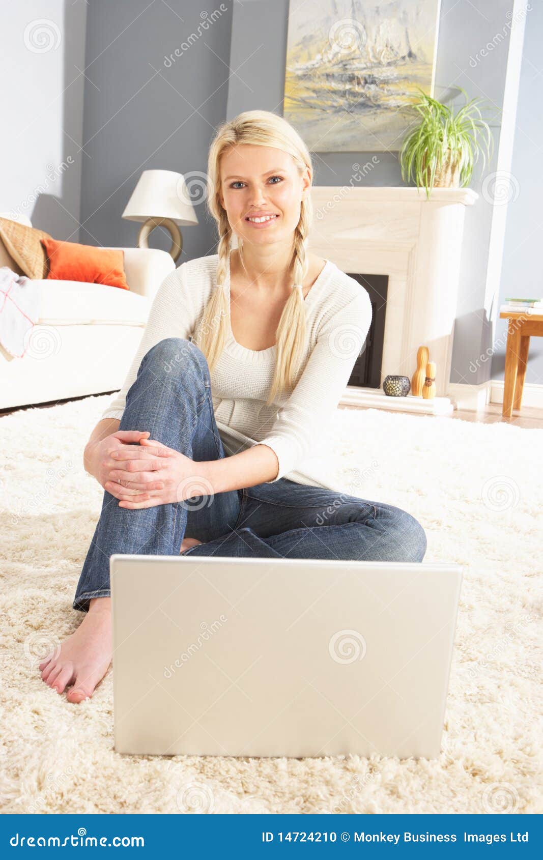 Woman Using Laptop Relaxing Sitting on Rug at Home Stock Photo - Image ...