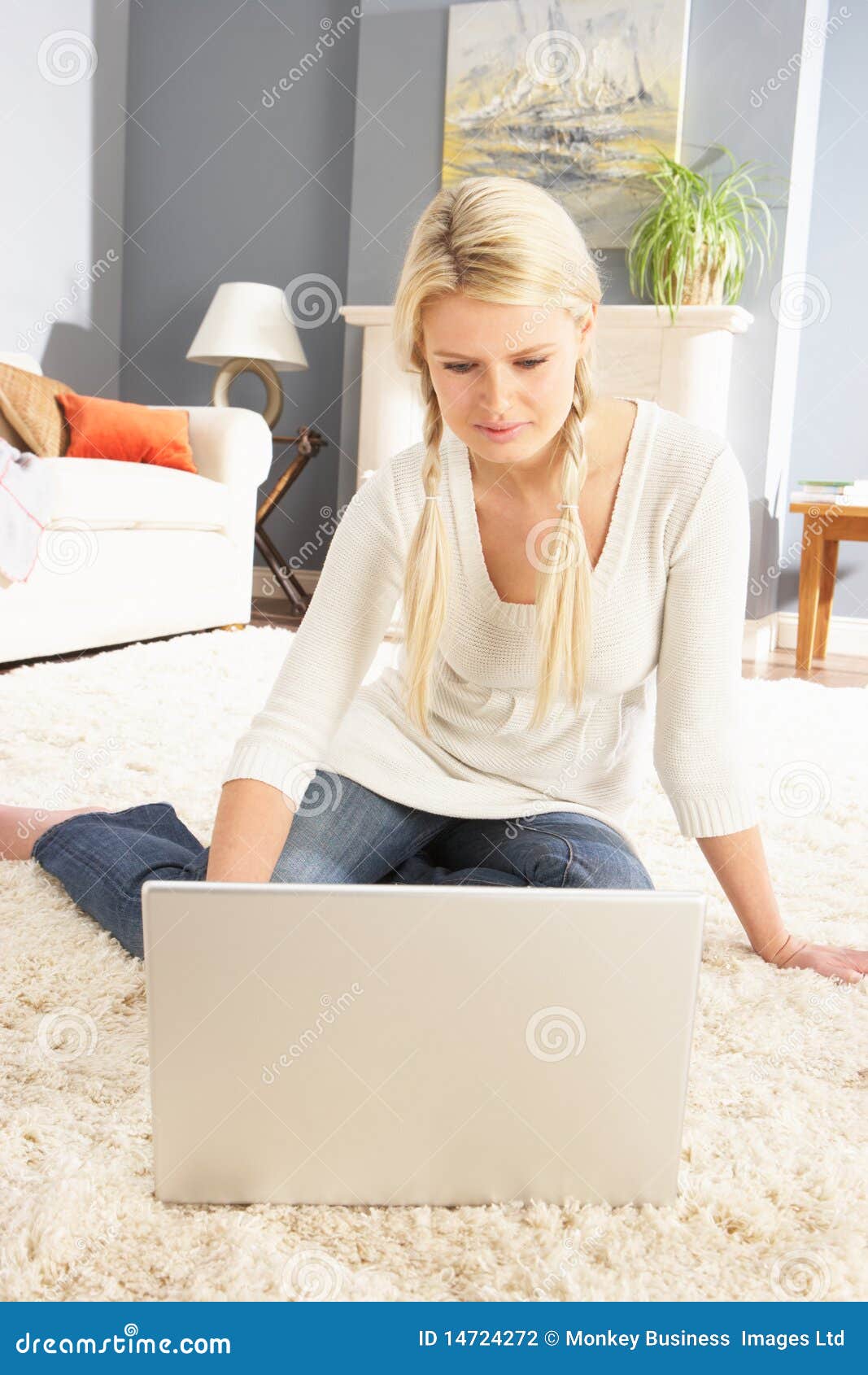 Woman Using Laptop Relaxing Sitting on Rug at Home Stock Photo - Image ...
