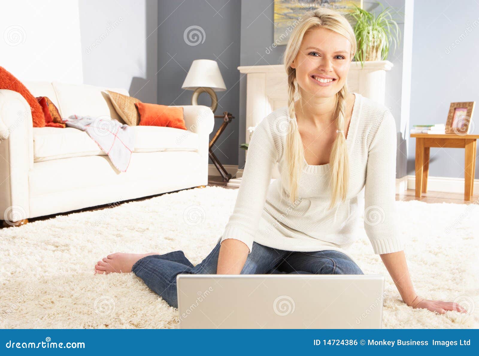 Woman Using Laptop Relaxing Sitting on Rug at Home Stock Photo - Image ...