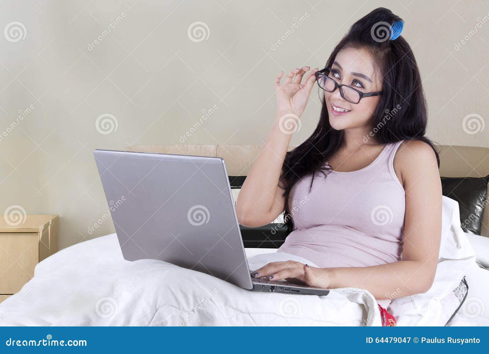 Woman Using Laptop while Thinking Stock Image - Image of dreaming ...
