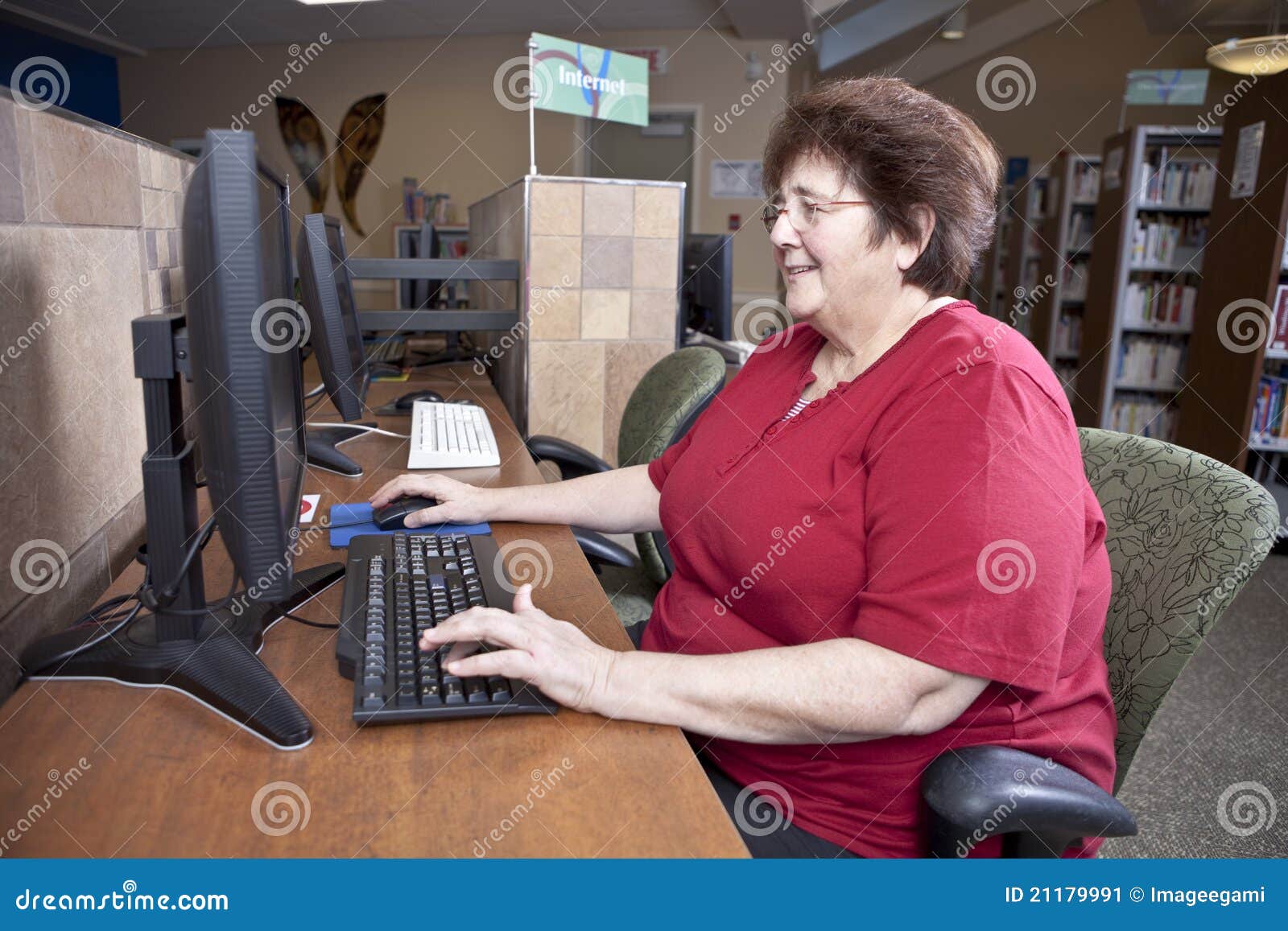Woman Using Library Computer Stock Image - Image of internet, older ...