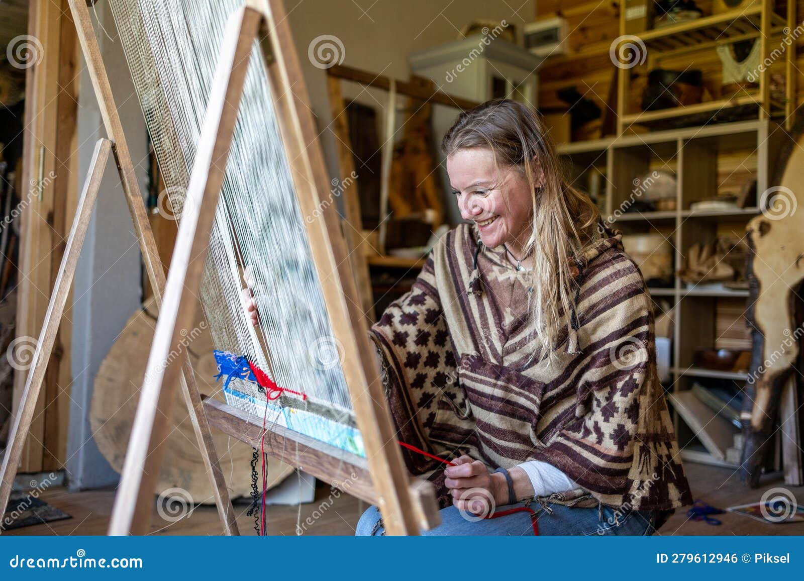Crafty Woman Weaving at a Loom at Her Workshop Stock Photo - Image of ...