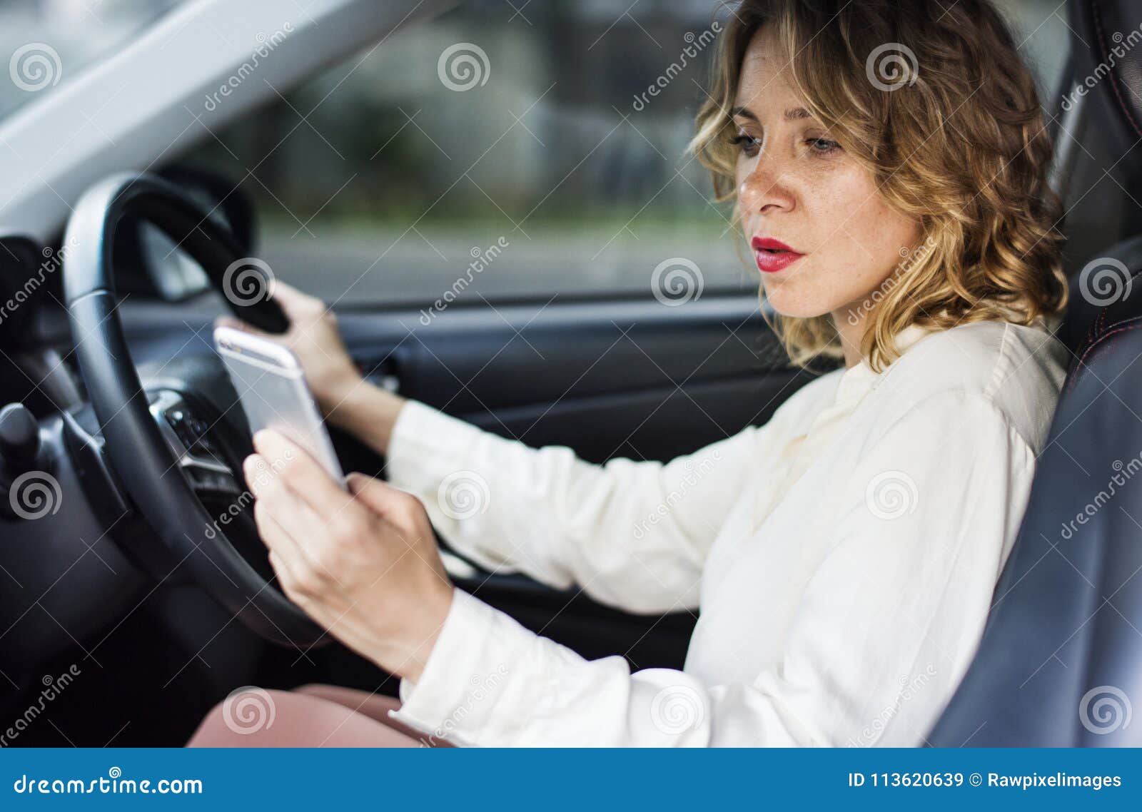 Woman Using Mobile Phone while Driving Stock Image - Image of morning ...