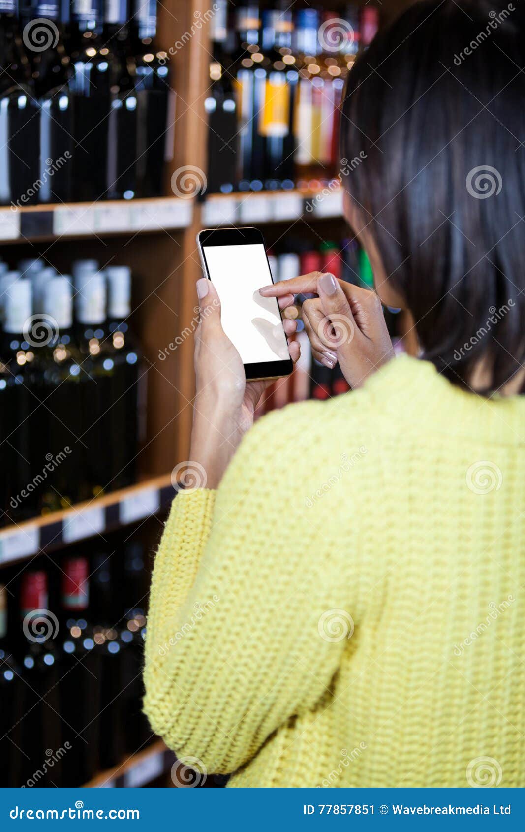 Woman Using Mobile Phone in Grocery Section Stock Image - Image of ...