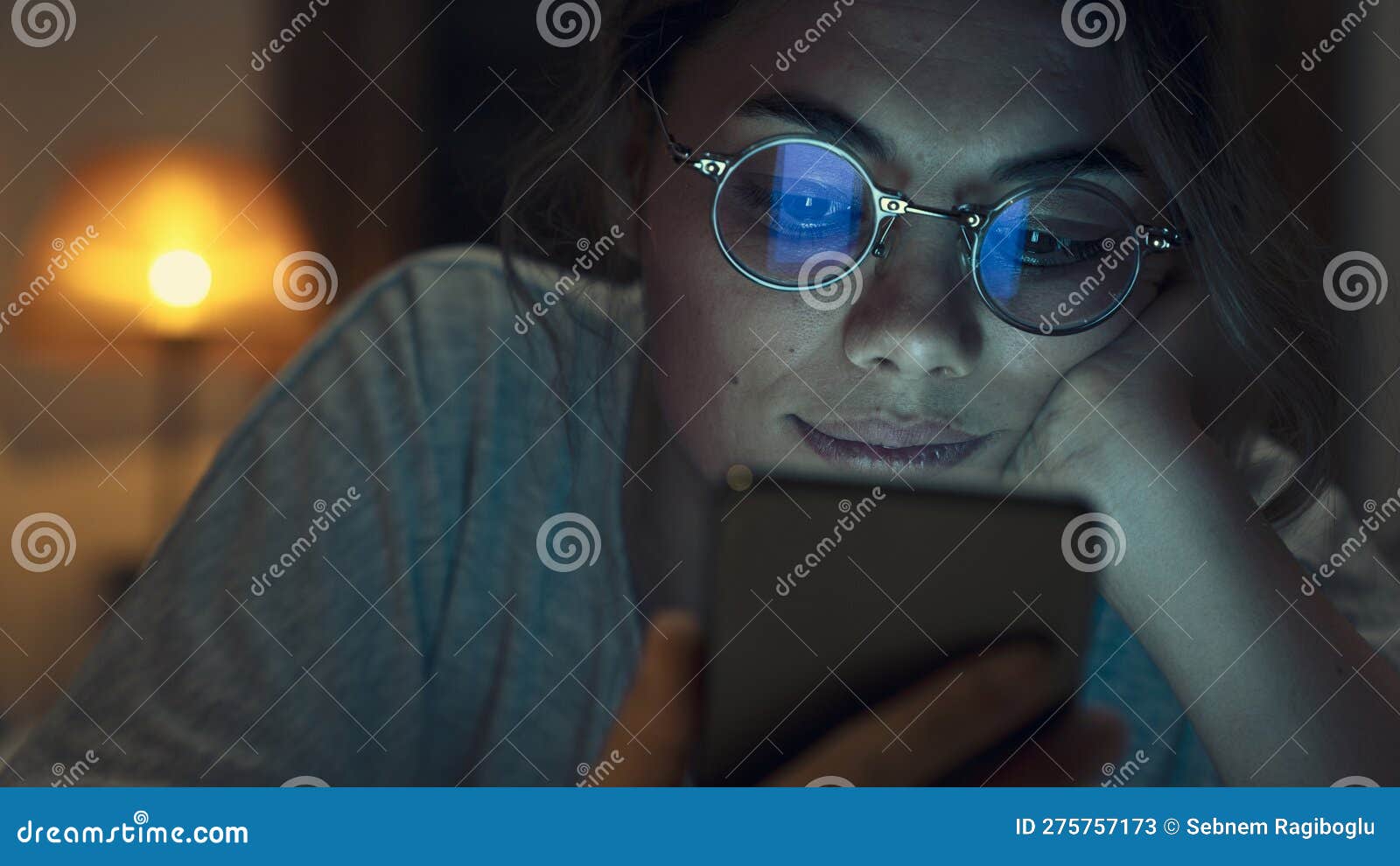 Woman Using Mobile Phone while Laying on Bed Stock Image - Image of ...