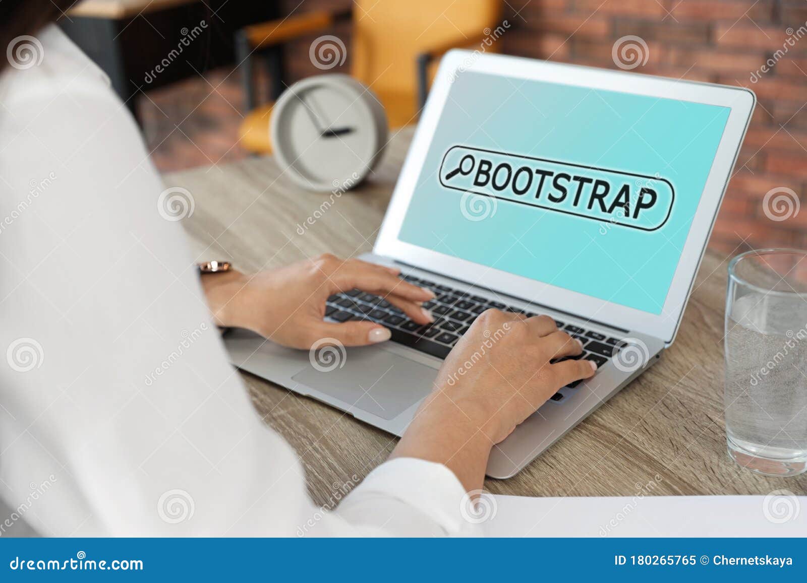 Woman Using Modern Laptop at Table in Office. Bootstrap Button Stock ...