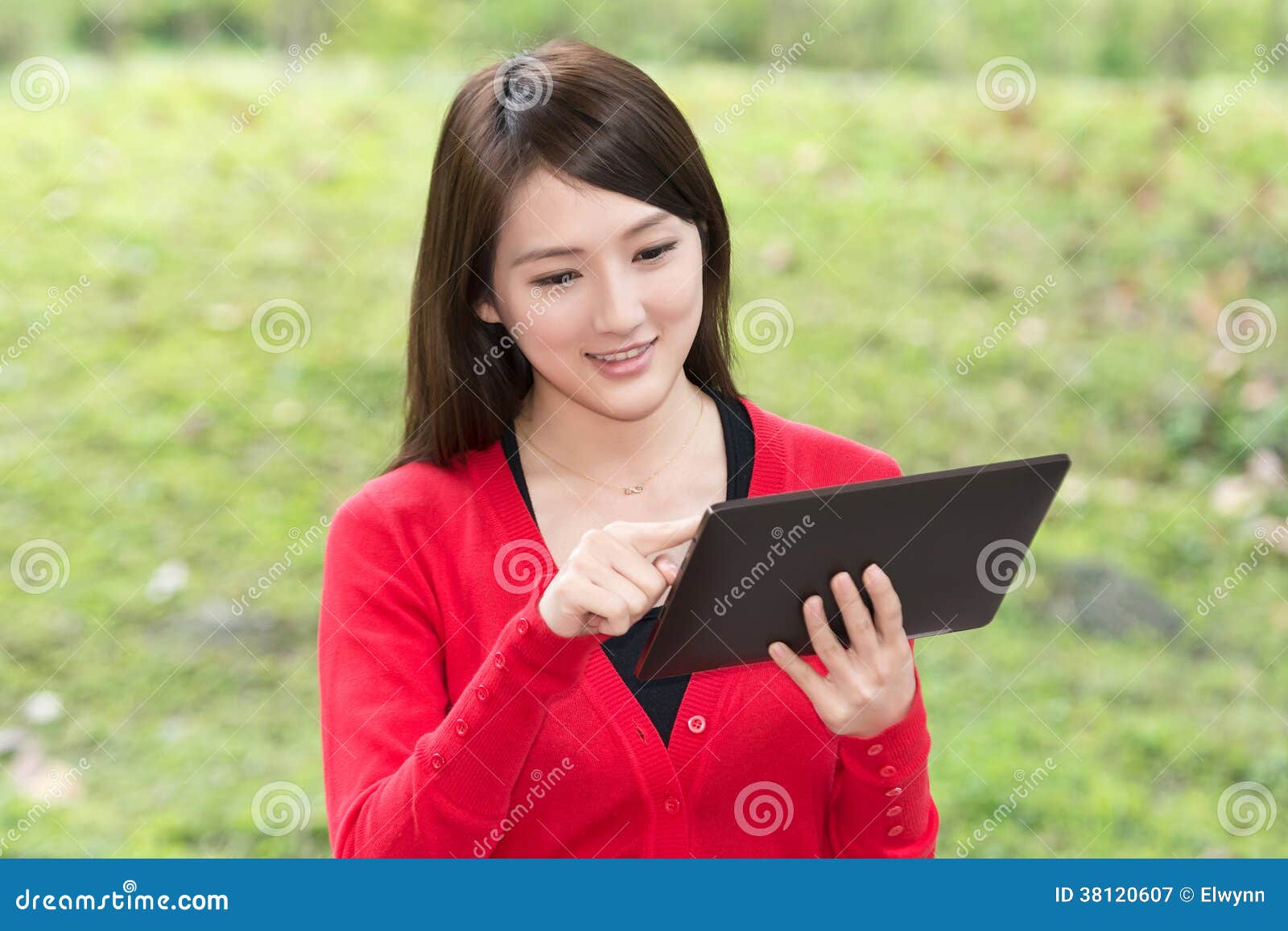 Woman using pad stock image. Image of female, outside - 38120607