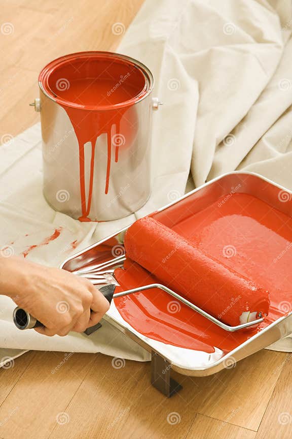 Woman using paint roller. stock photo. Image of home, indoors - 3533242