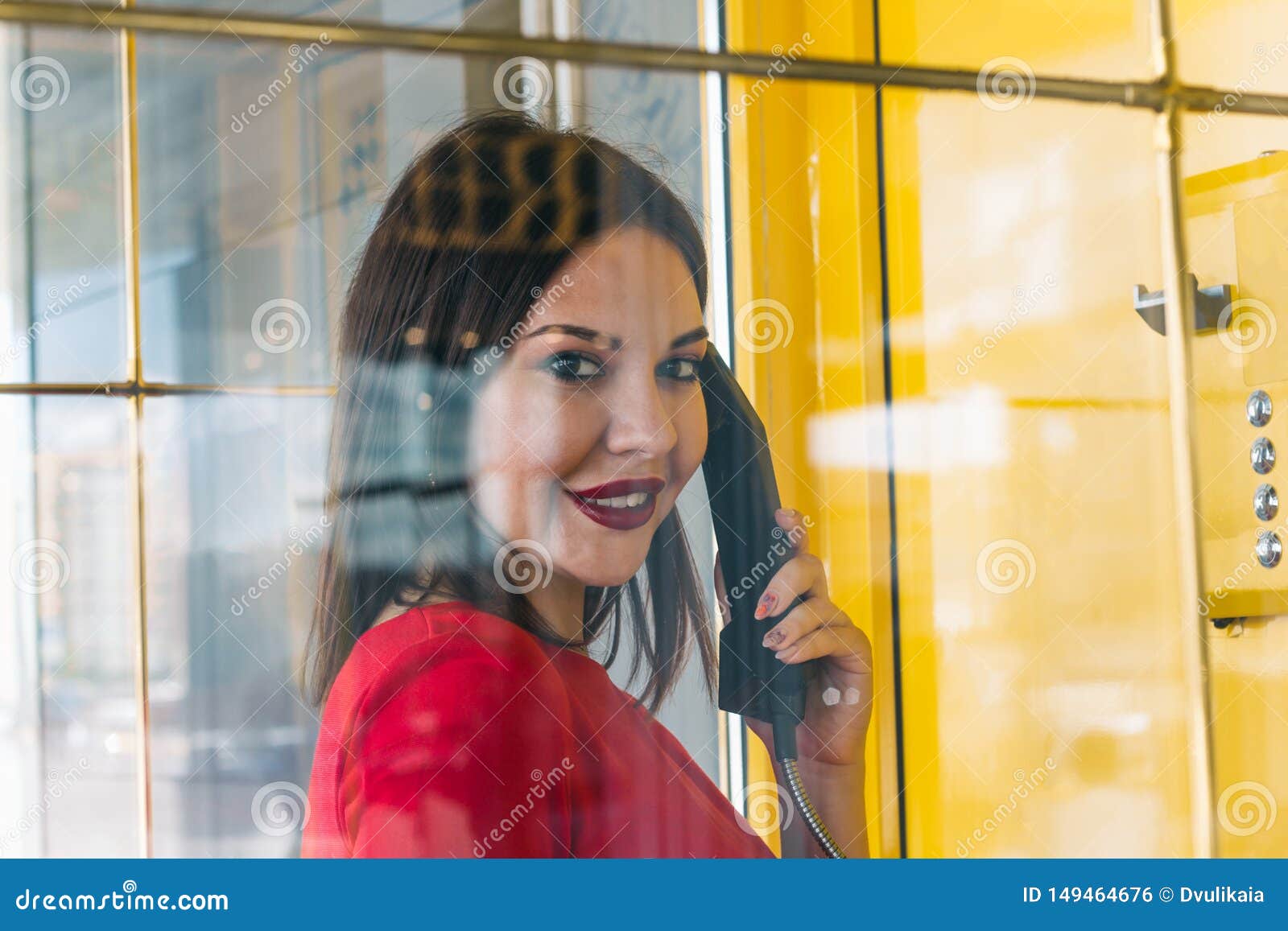 Woman using payphone stock photo. Image of person, booth - 149464676