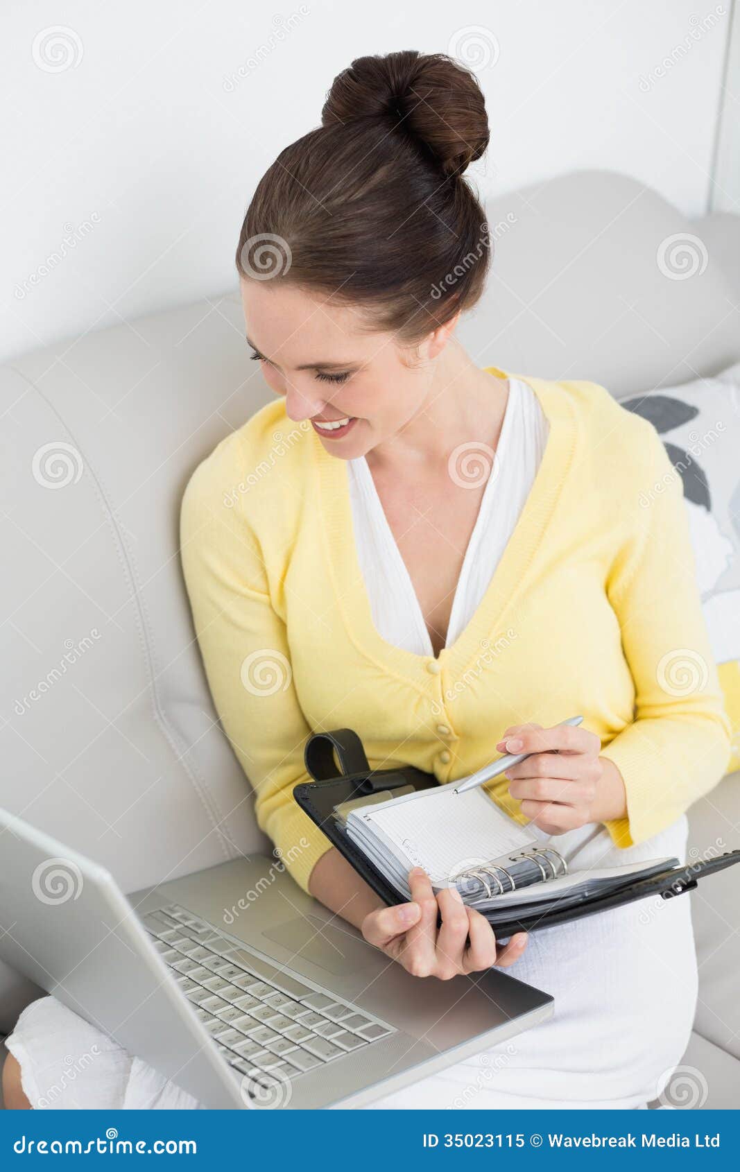 Woman Using Personal Organizer and Laptop Stock Image - Image of ...