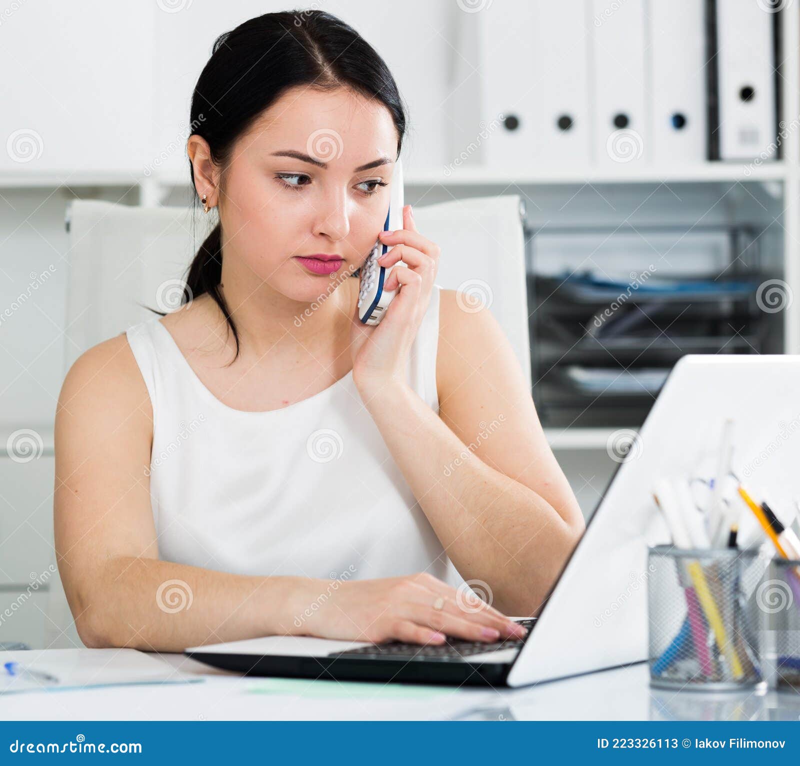 Woman Using Phone in Office Stock Image - Image of office, japanese ...
