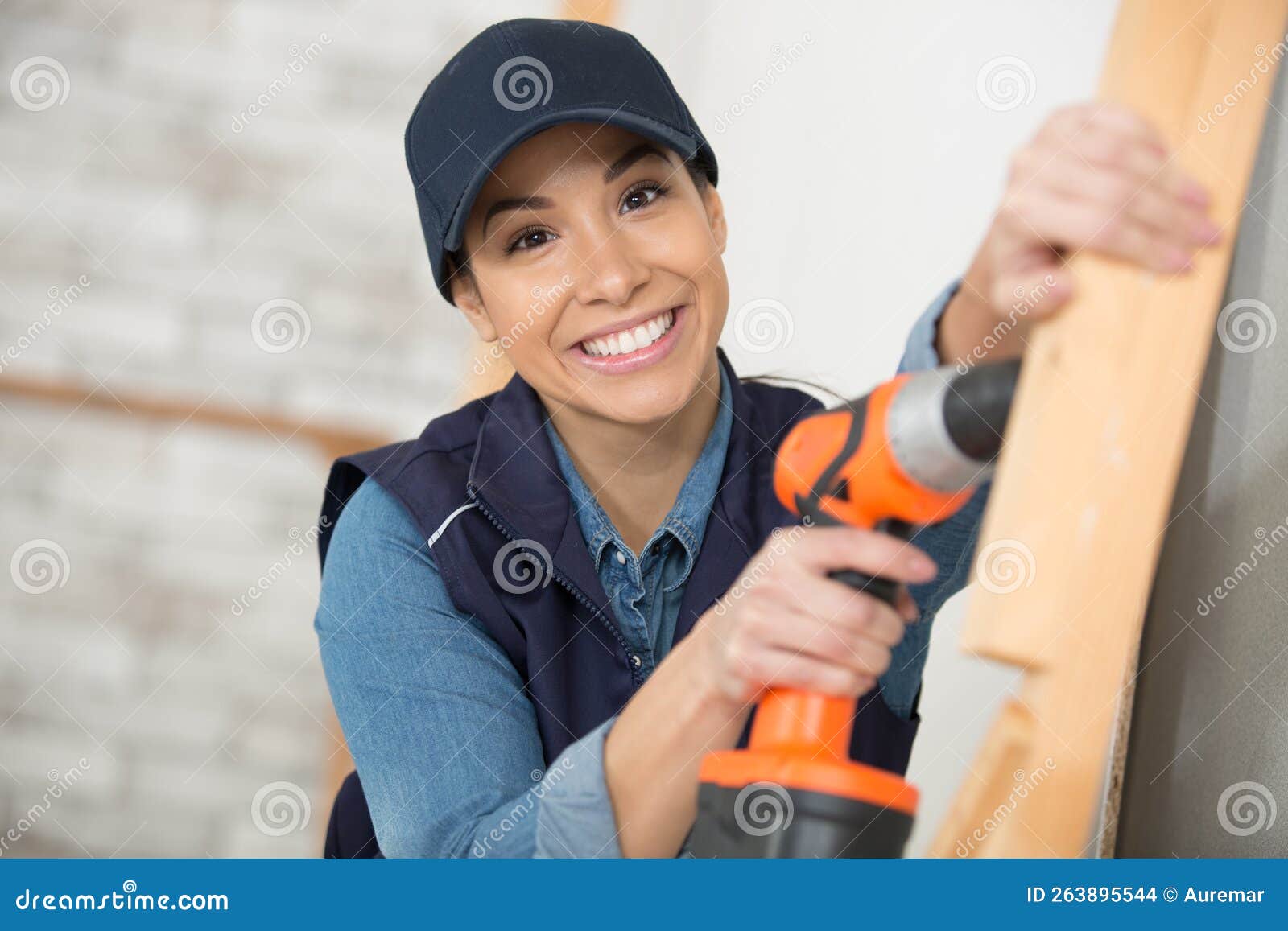 Woman Using Power Tool on Wooden Door Frame Stock Photo - Image of ...