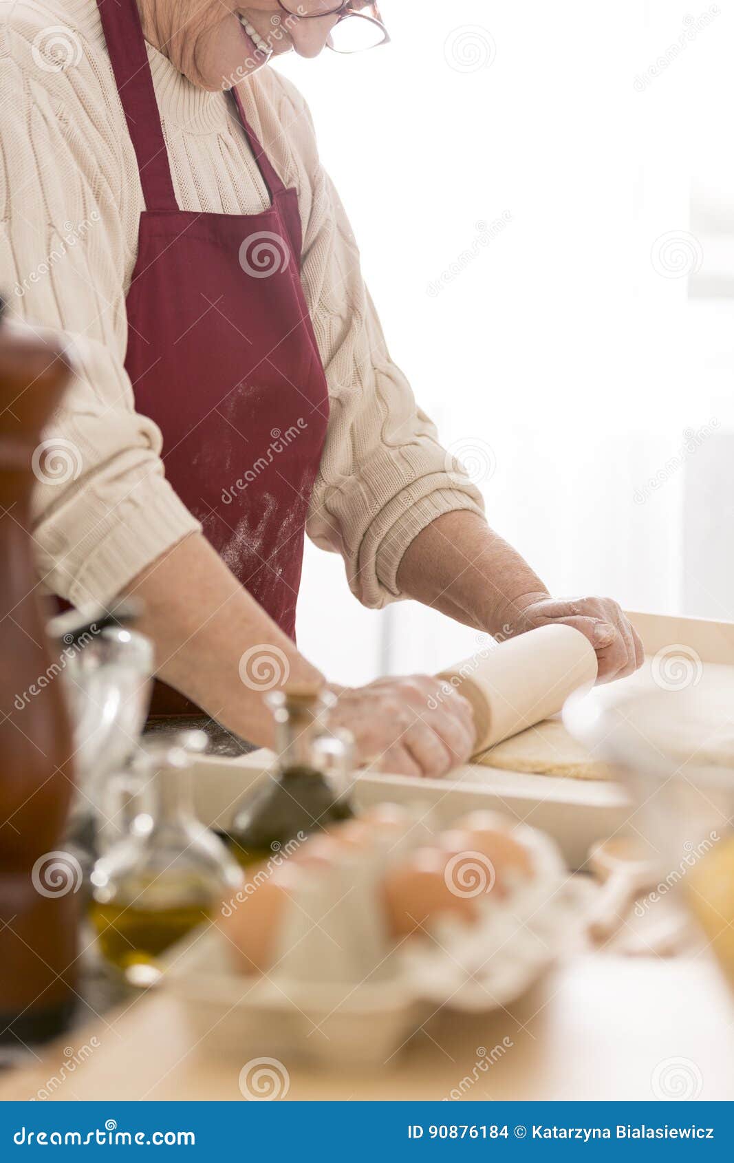 Woman using rolling pin stock photo. Image of house, kitchen - 90876184