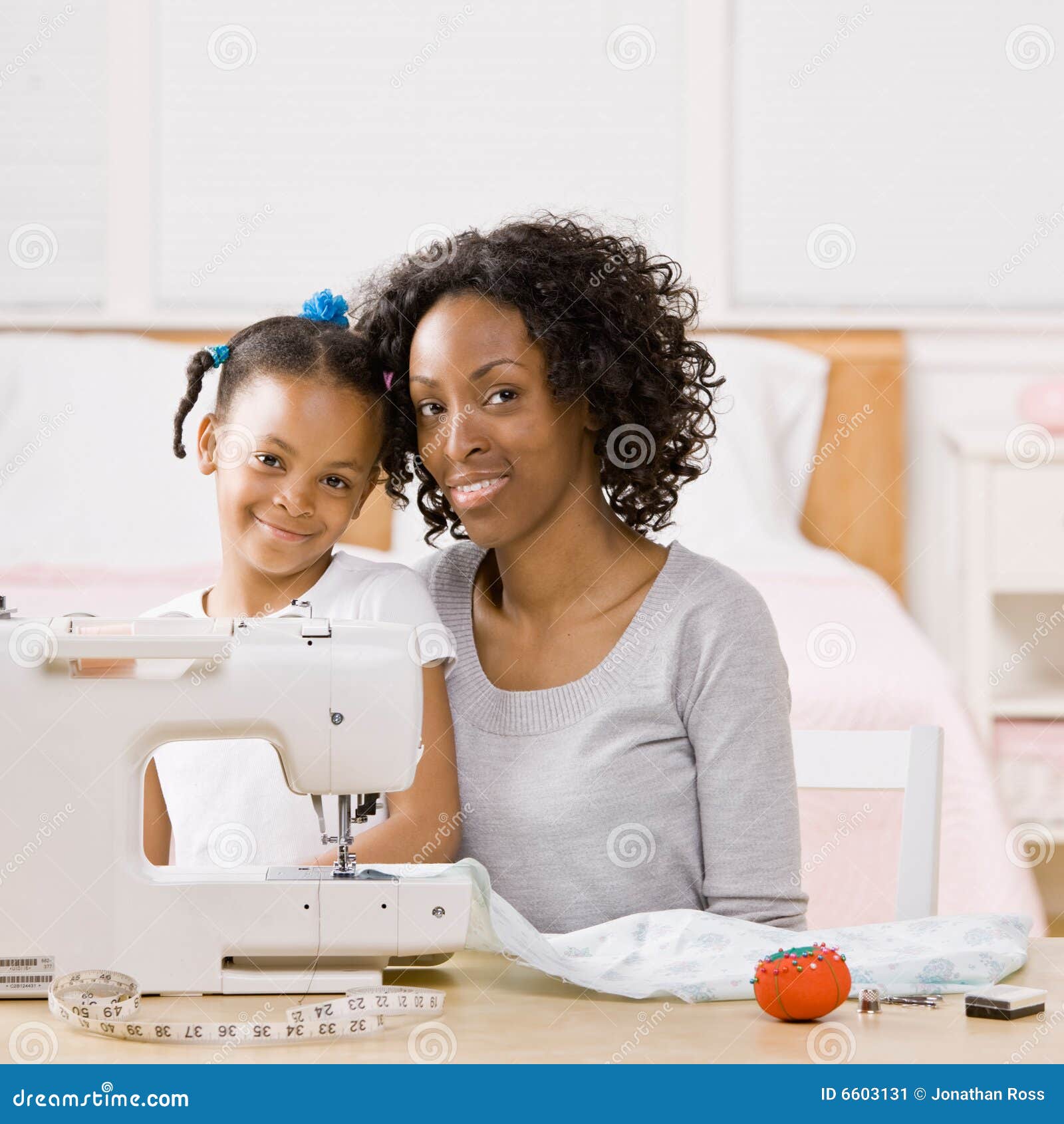 Woman Using Sewing Machine With Daughter Stock Image Image Of Head