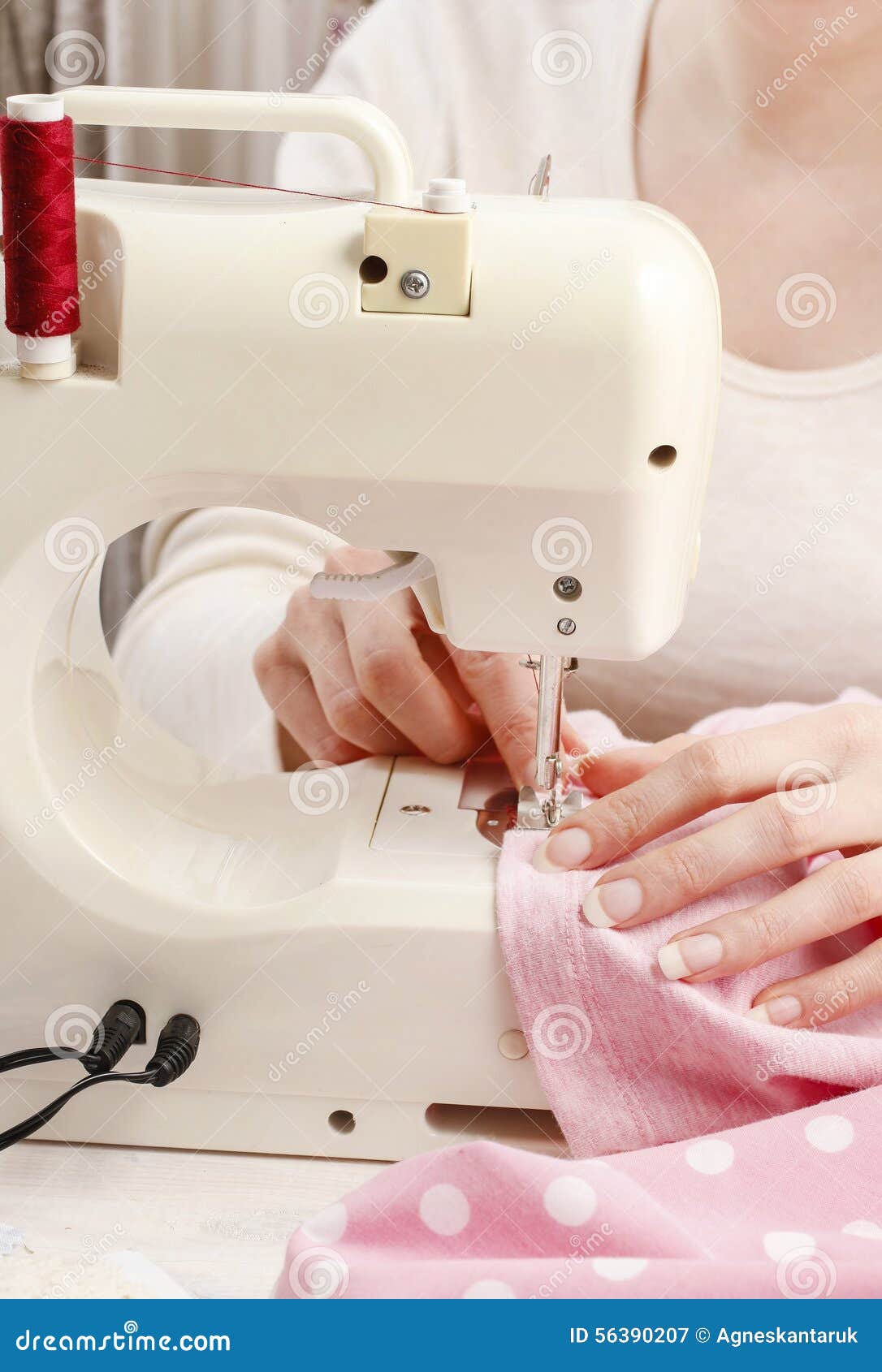 Woman using sewing machine stock image. Image of craft - 56390207