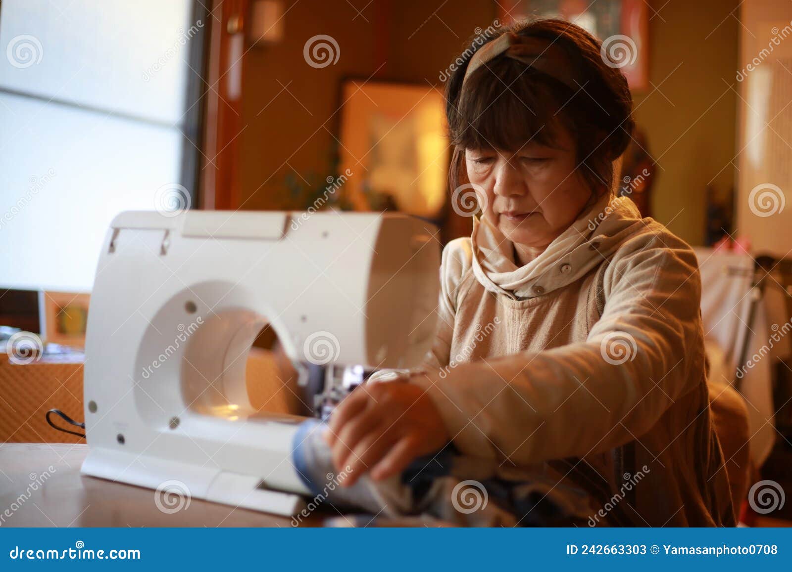 Woman Using a Sewing Machine Stock Image - Image of refreshing ...