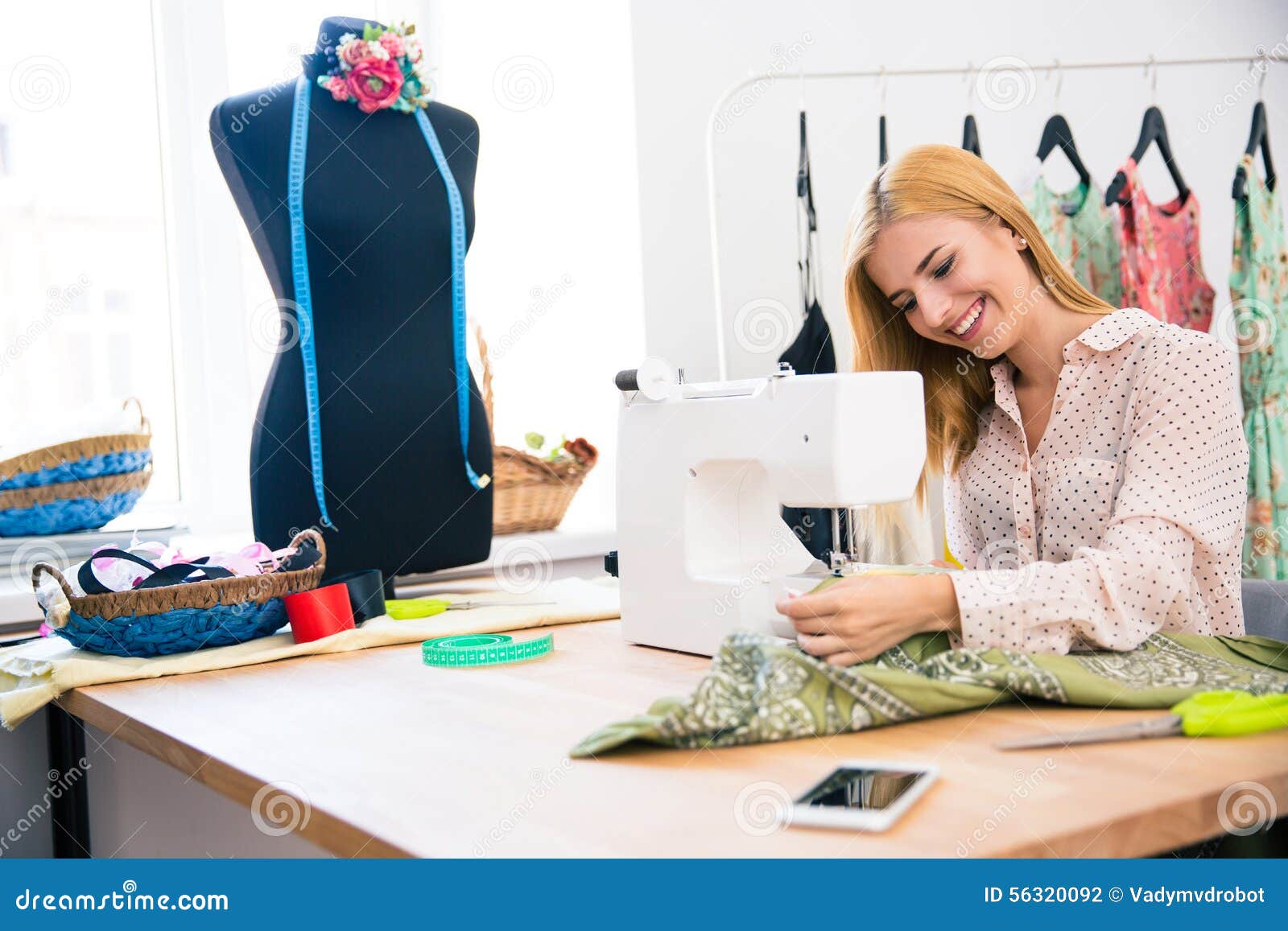 Woman using sewing machine stock photo. Image of adult - 56320092