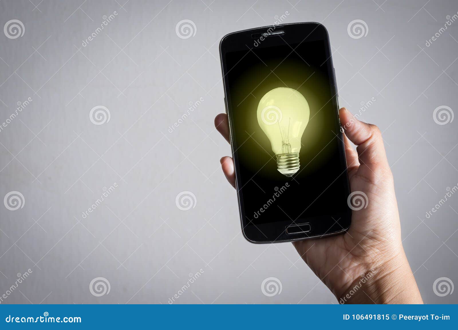 Smartphone in Hand, Idea Lamp on Screen Stock Image - Image of female ...