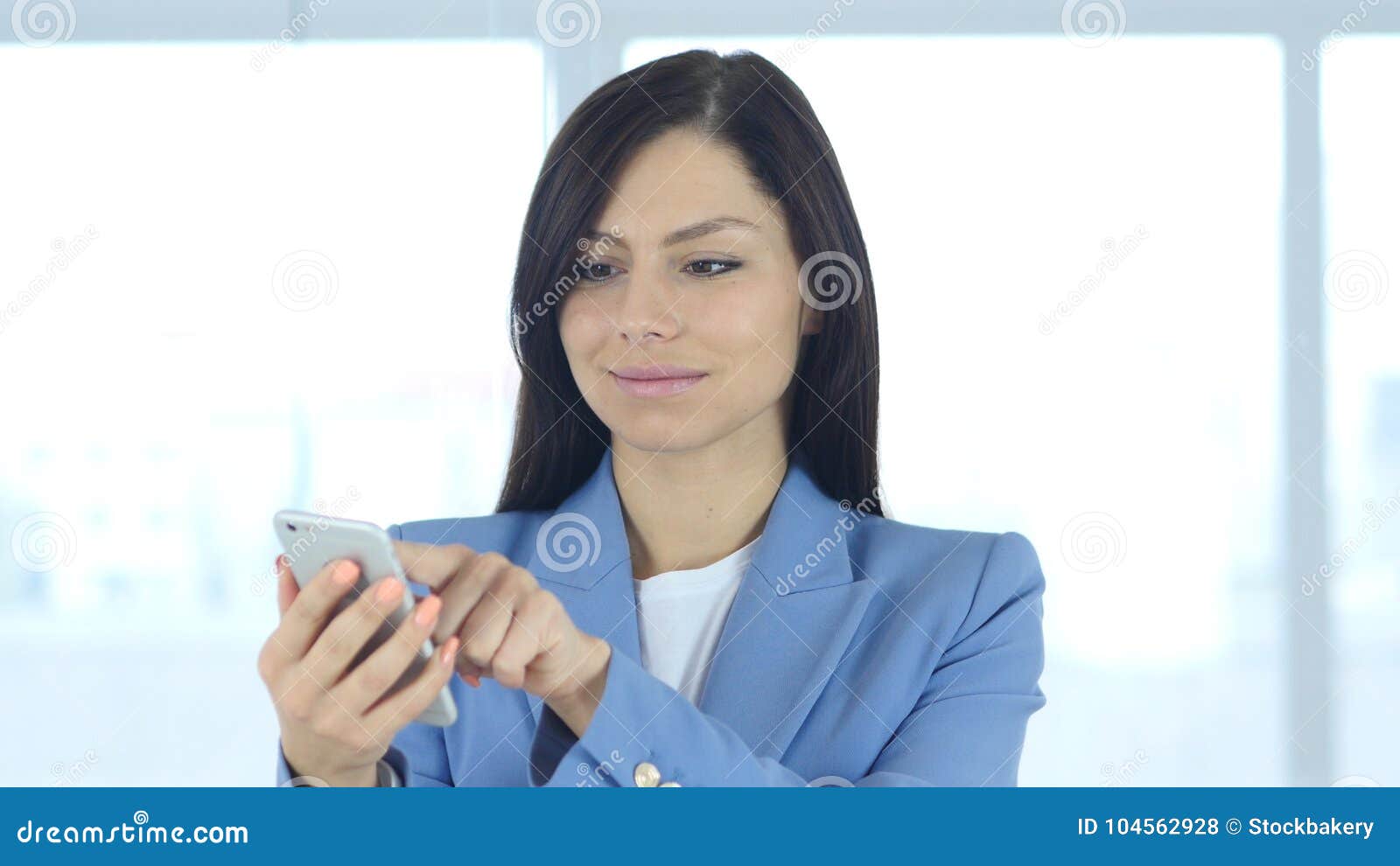 Woman Using Smartphone at Work for Browsing Stock Photo - Image of ...