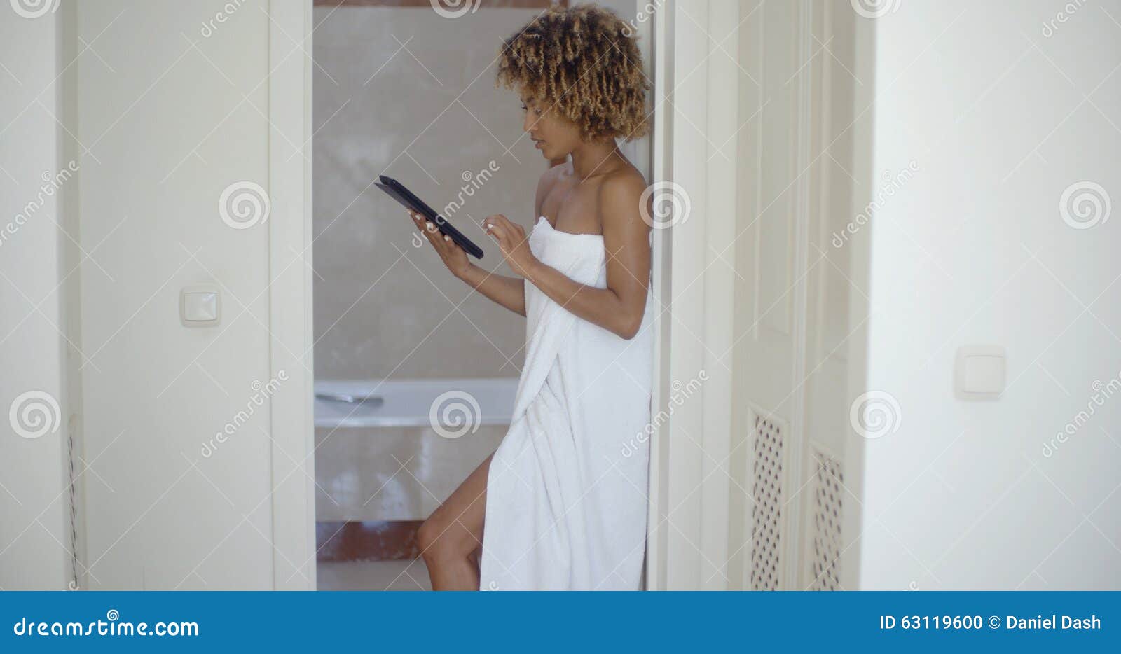 Woman Using Tablet Computer in Bathroom Stock Photo - Image of healthy ...