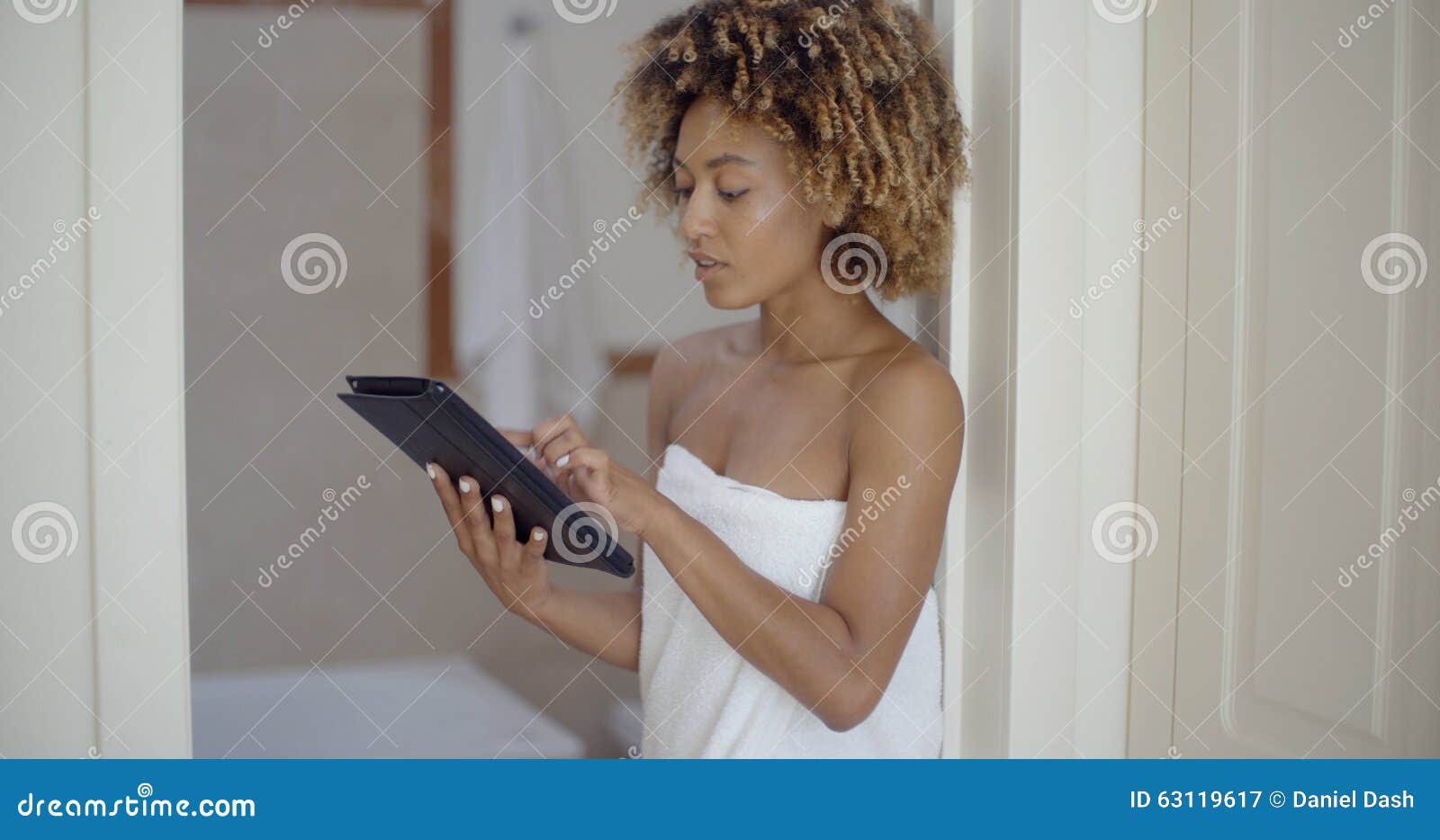 Woman Using Tablet Computer in Bathroom Stock Image - Image of tablet ...